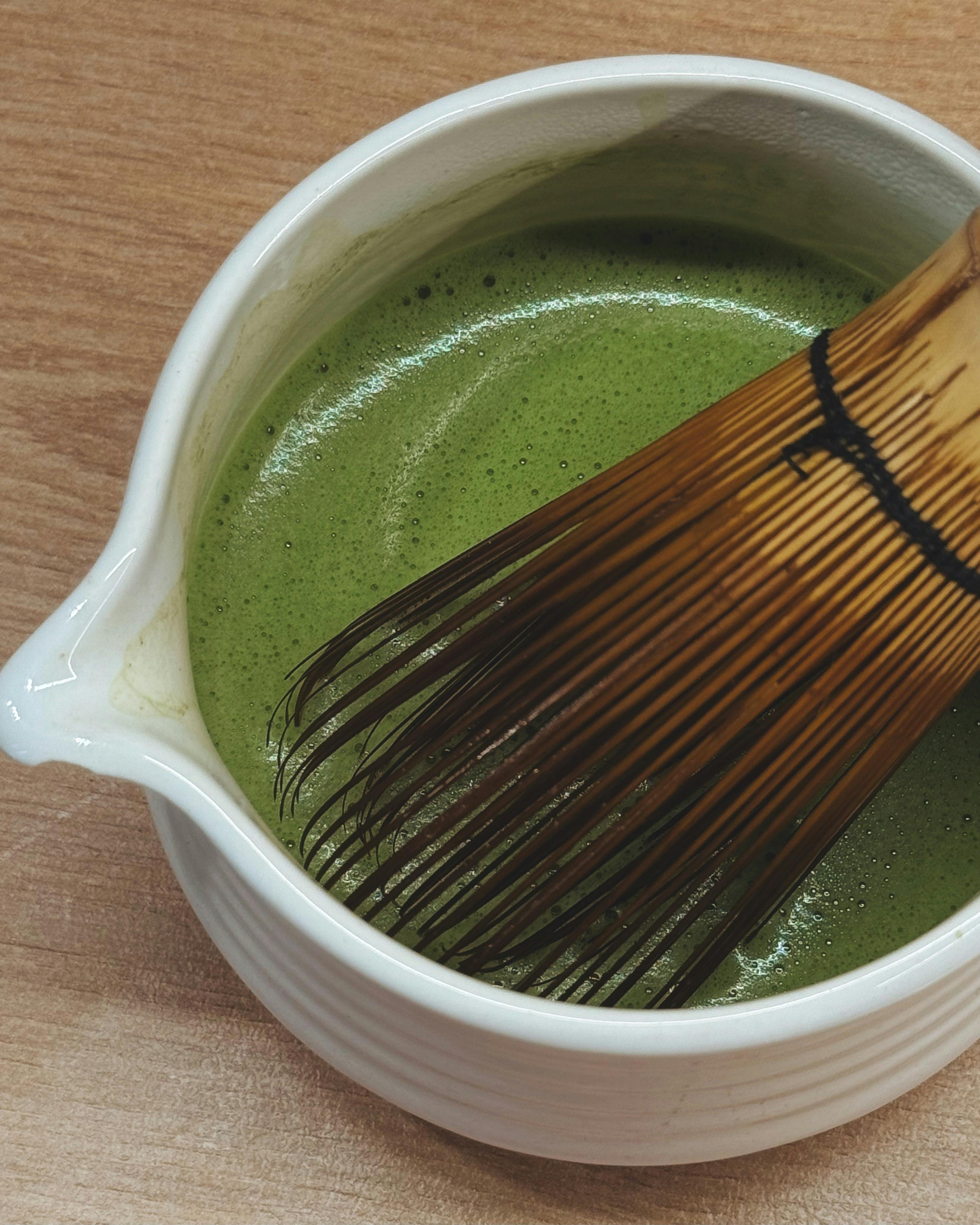 Traditional Matcha Tea Preparation in Ceramic Bowl · Free Stock Photo