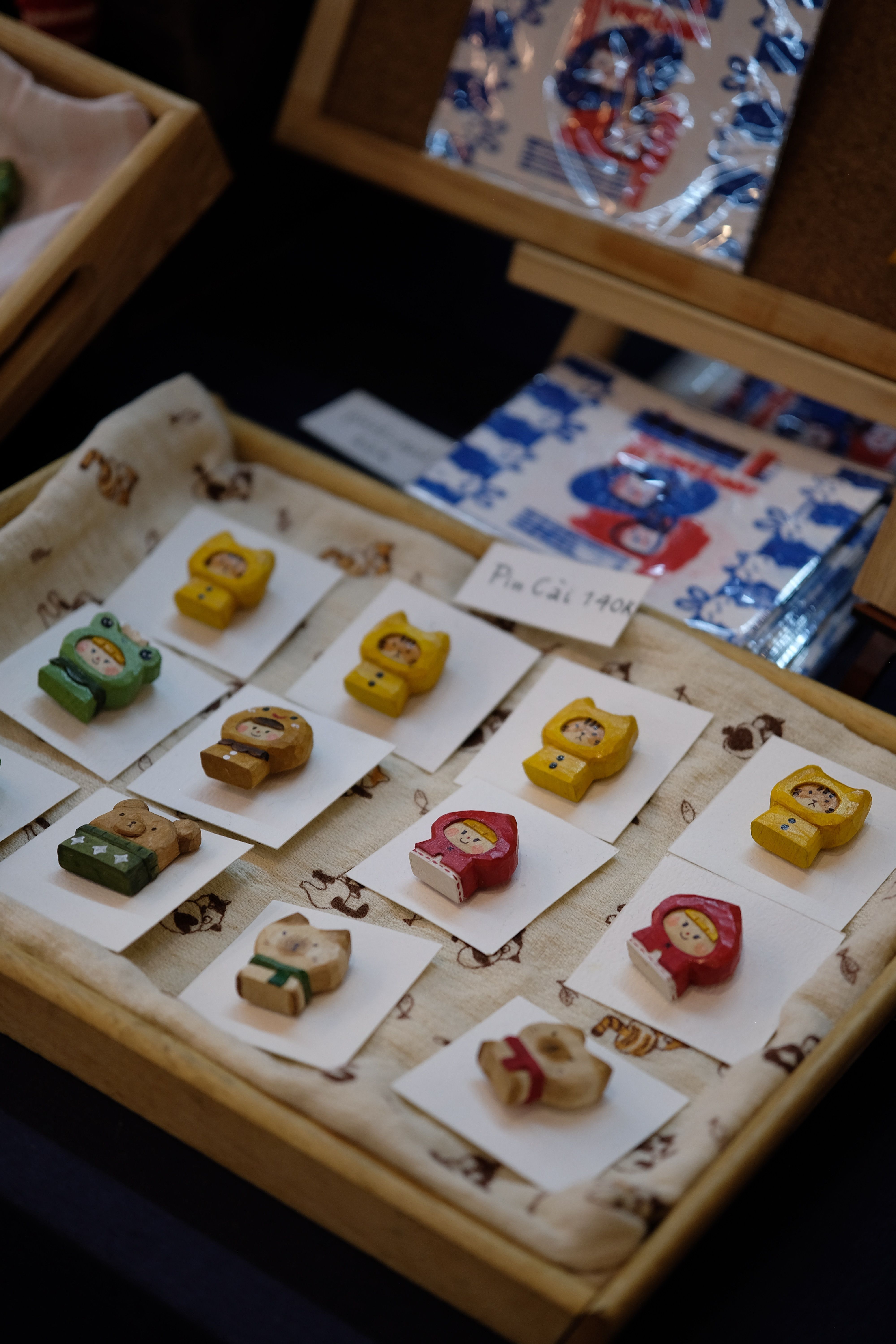 Colorful Handmade Miniature Figurines on Display · Free Stock Photo