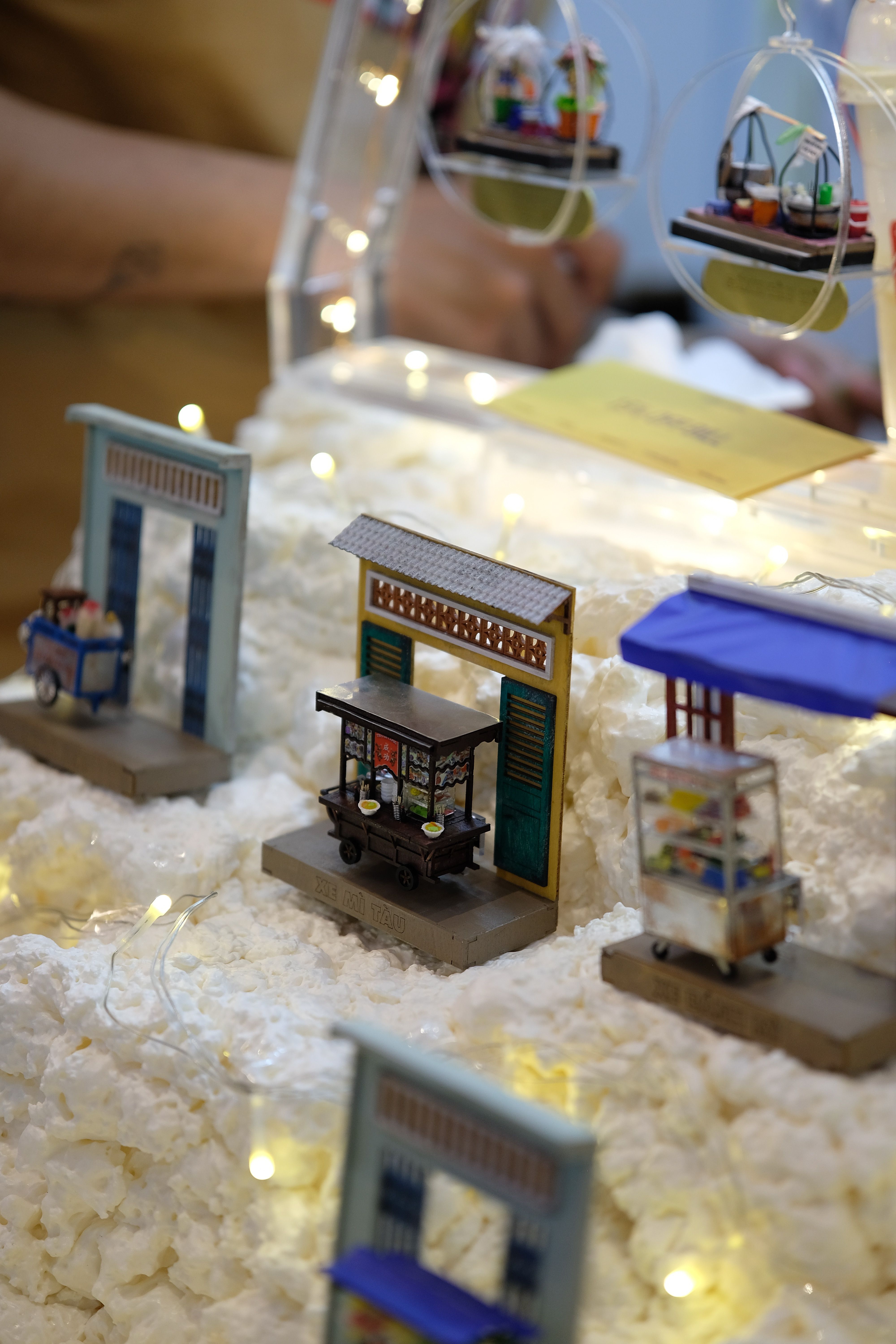 Miniature Market Scene with Illuminated Stalls · Free Stock Photo