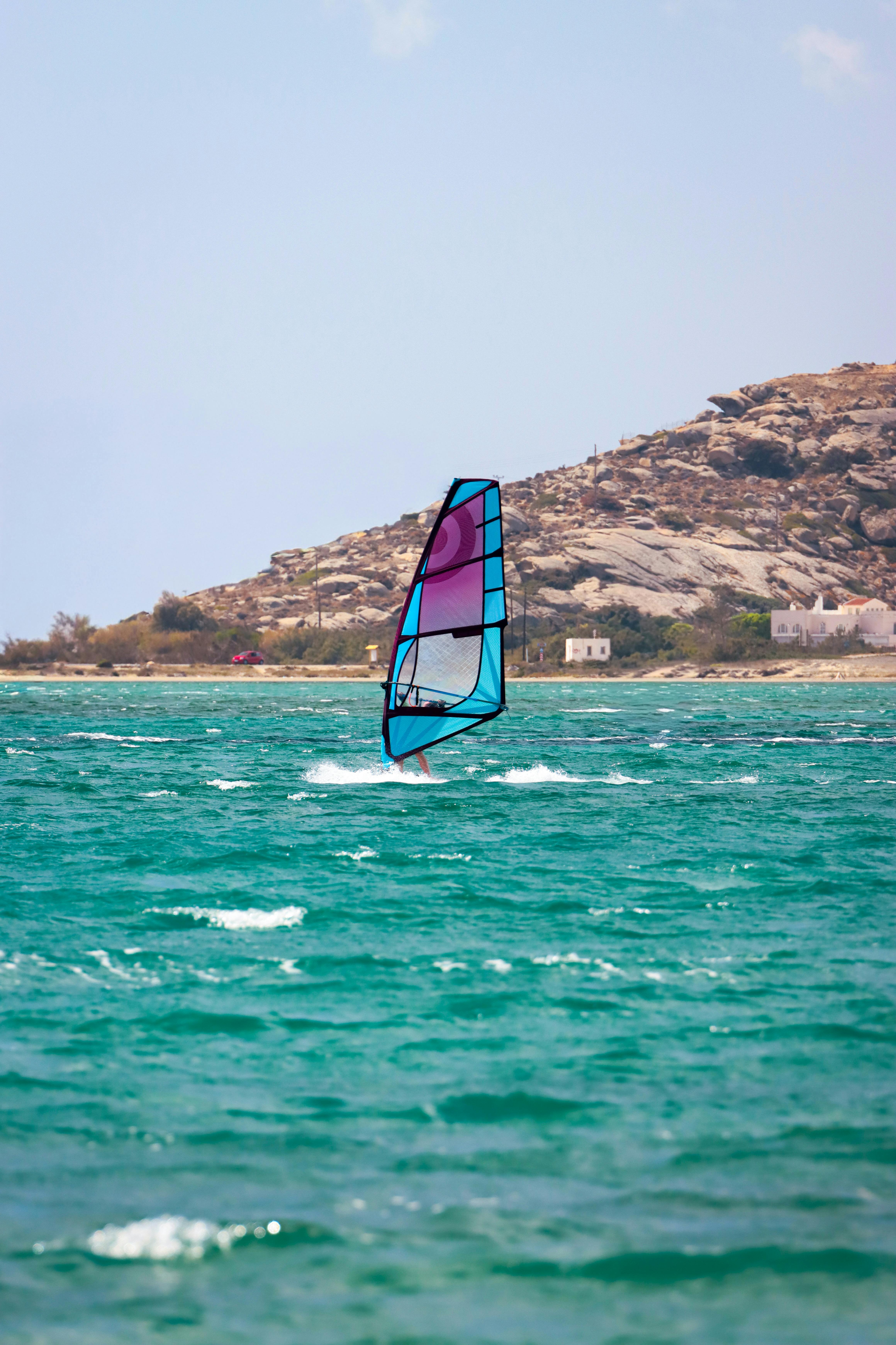 Windsurfer on Vibrant Waters of Naxos, Greece · Free Stock Photo