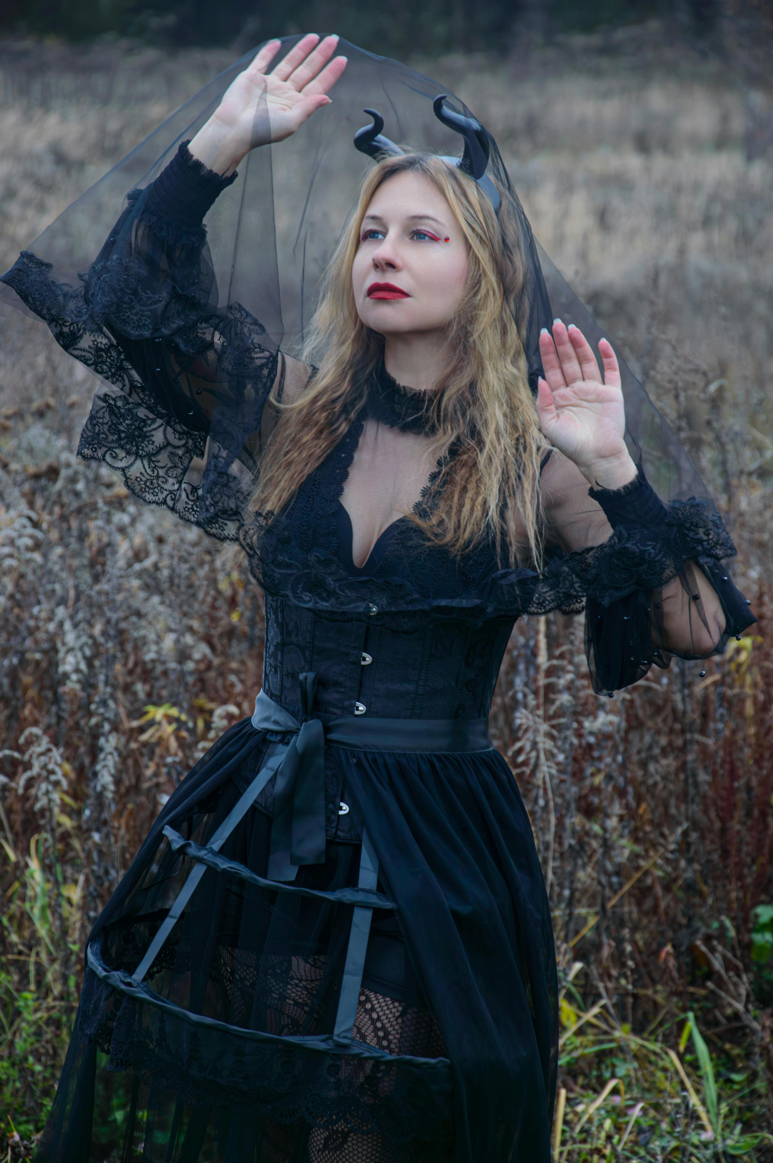 Woman in Gothic Black Outfit Outdoors · Free Stock Photo