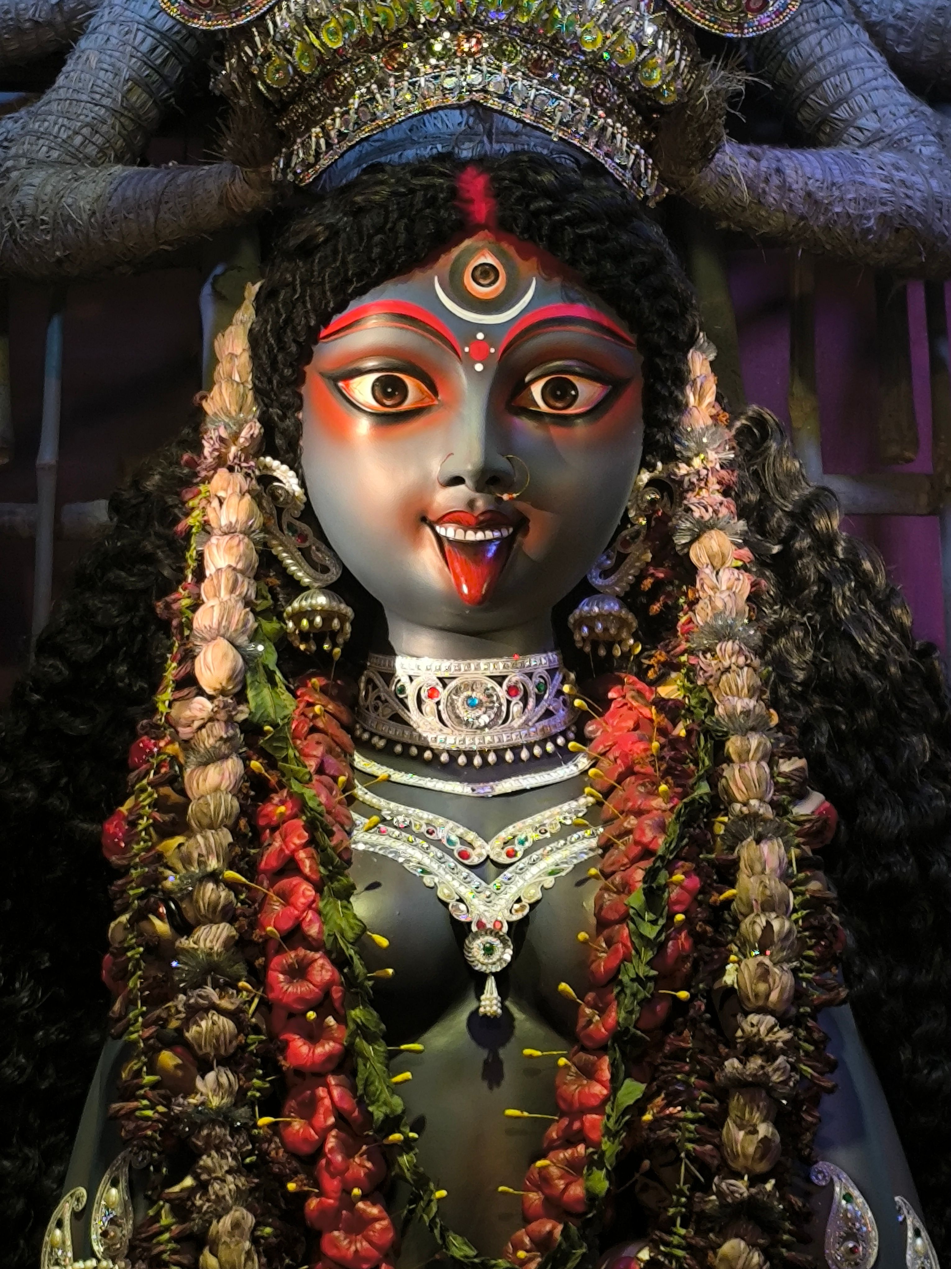 Kali Idol Adorned with Flowers and Ornaments · Free Stock Photo
