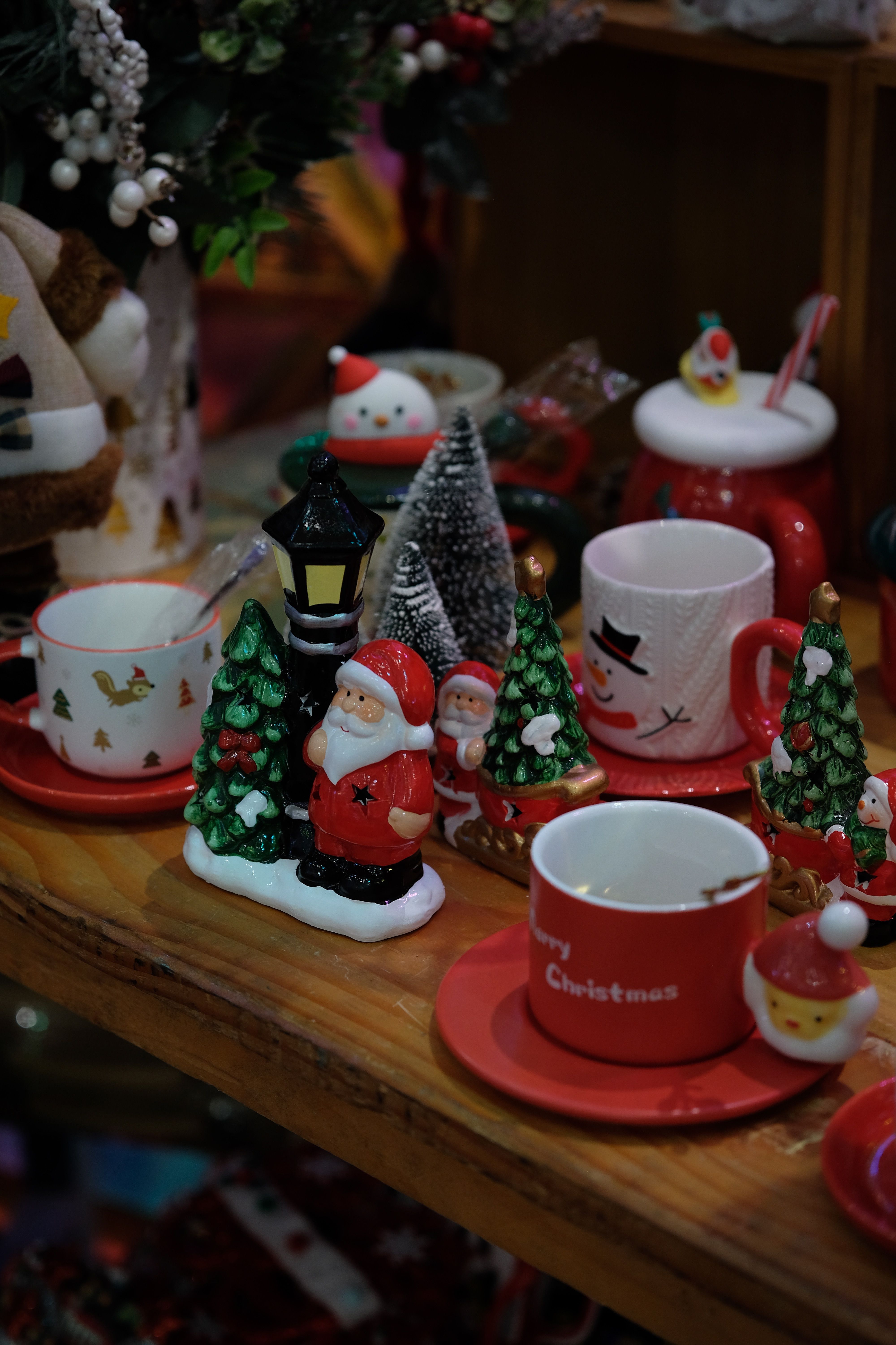 Christmas Themed Shop Display with Mugs and Ornaments · Free Stock Photo