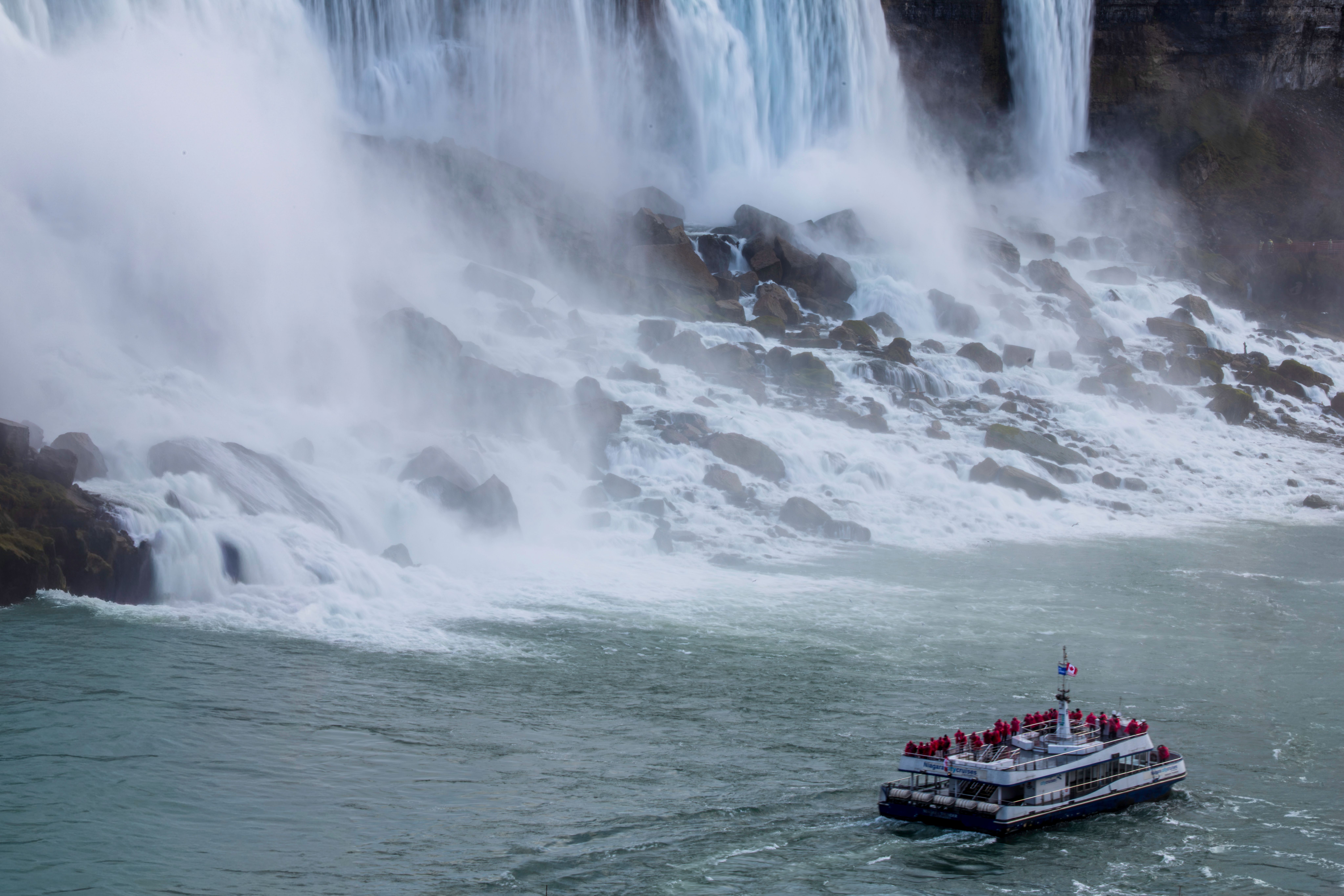Photo of Ship Near Waterfalls · Free Stock Photo