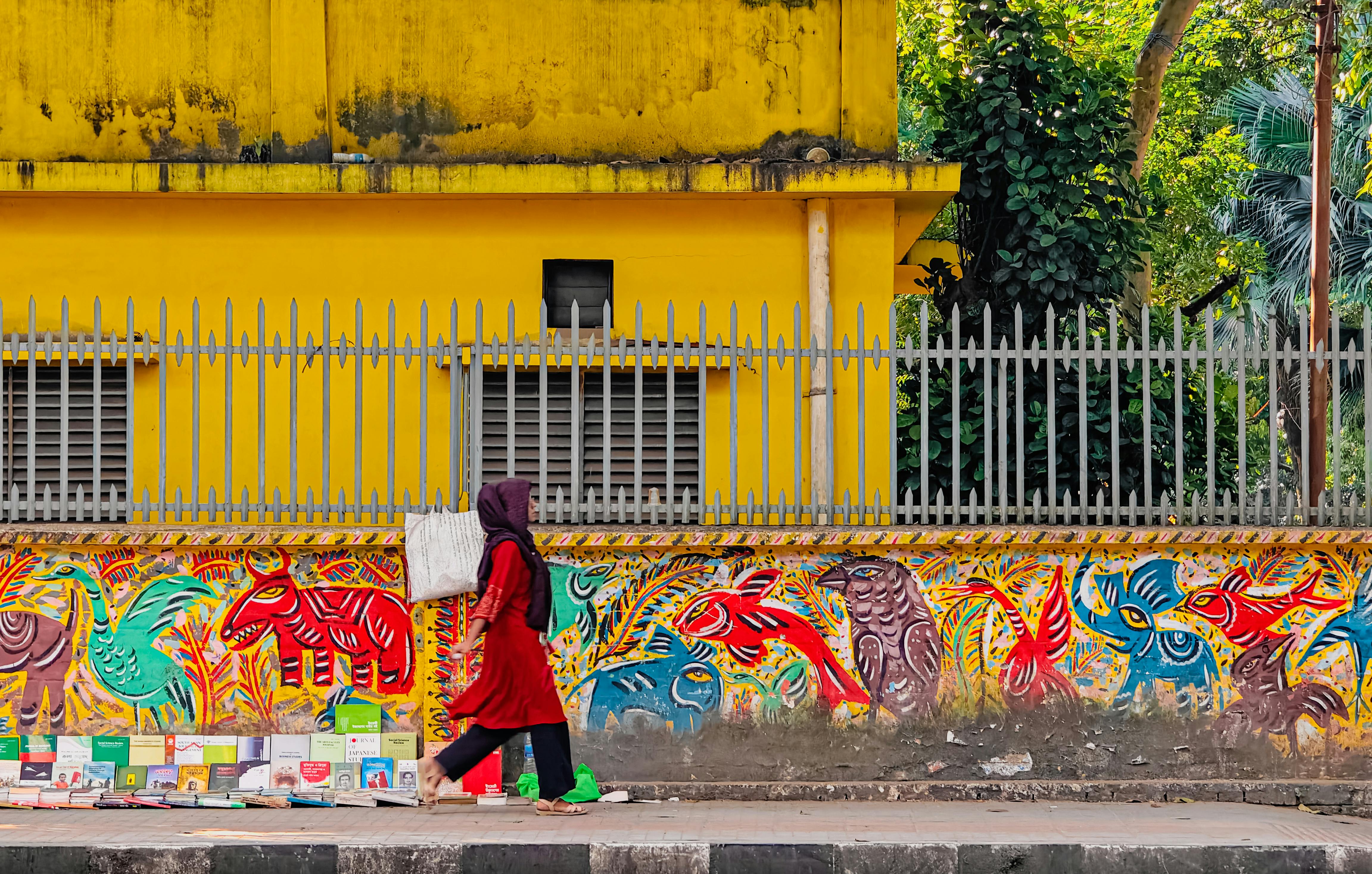 Colorful Street Art with Woman Walking By · Free Stock Photo