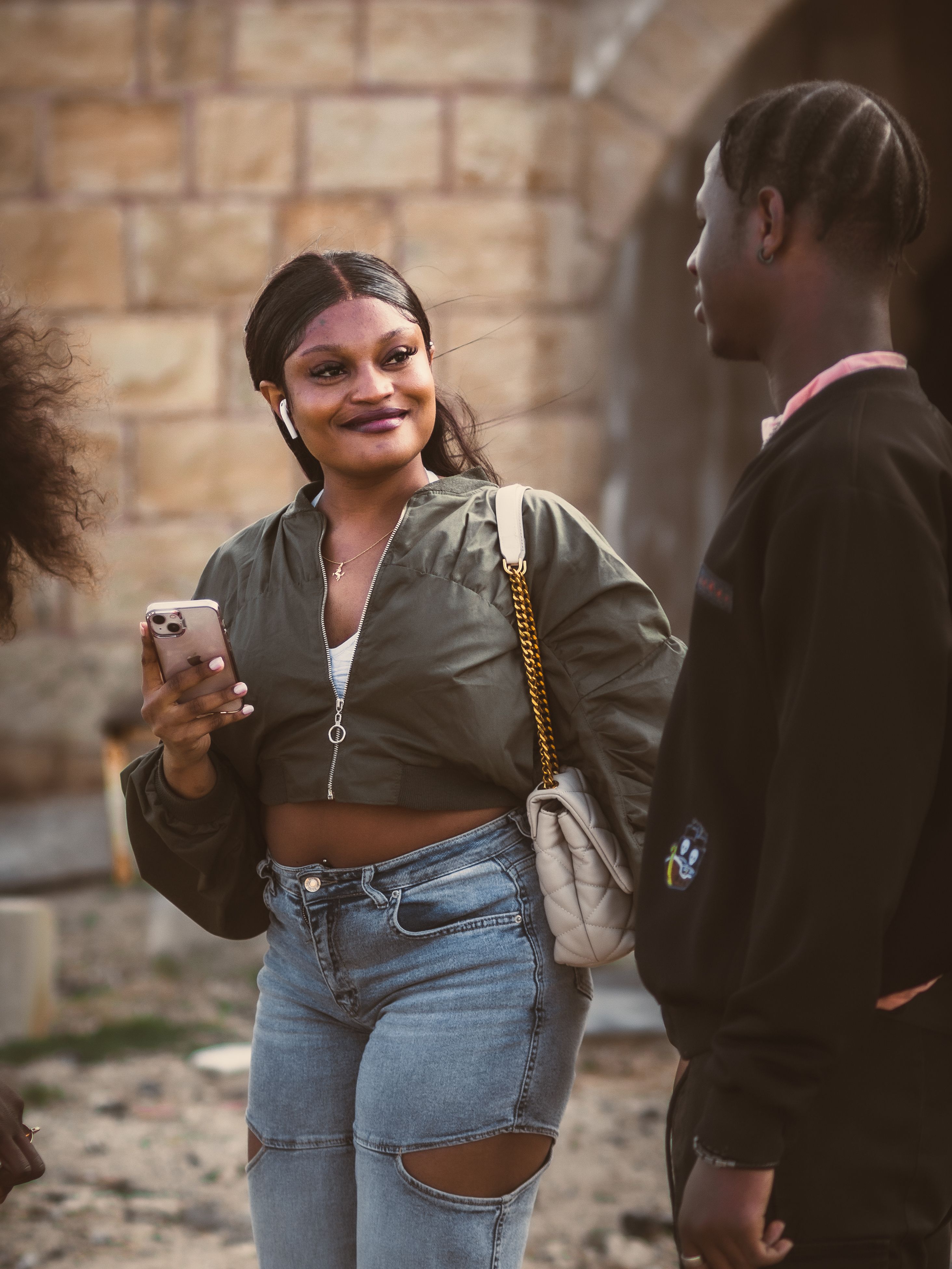 Casual Conversation Among Friends Outdoors · Free Stock Photo