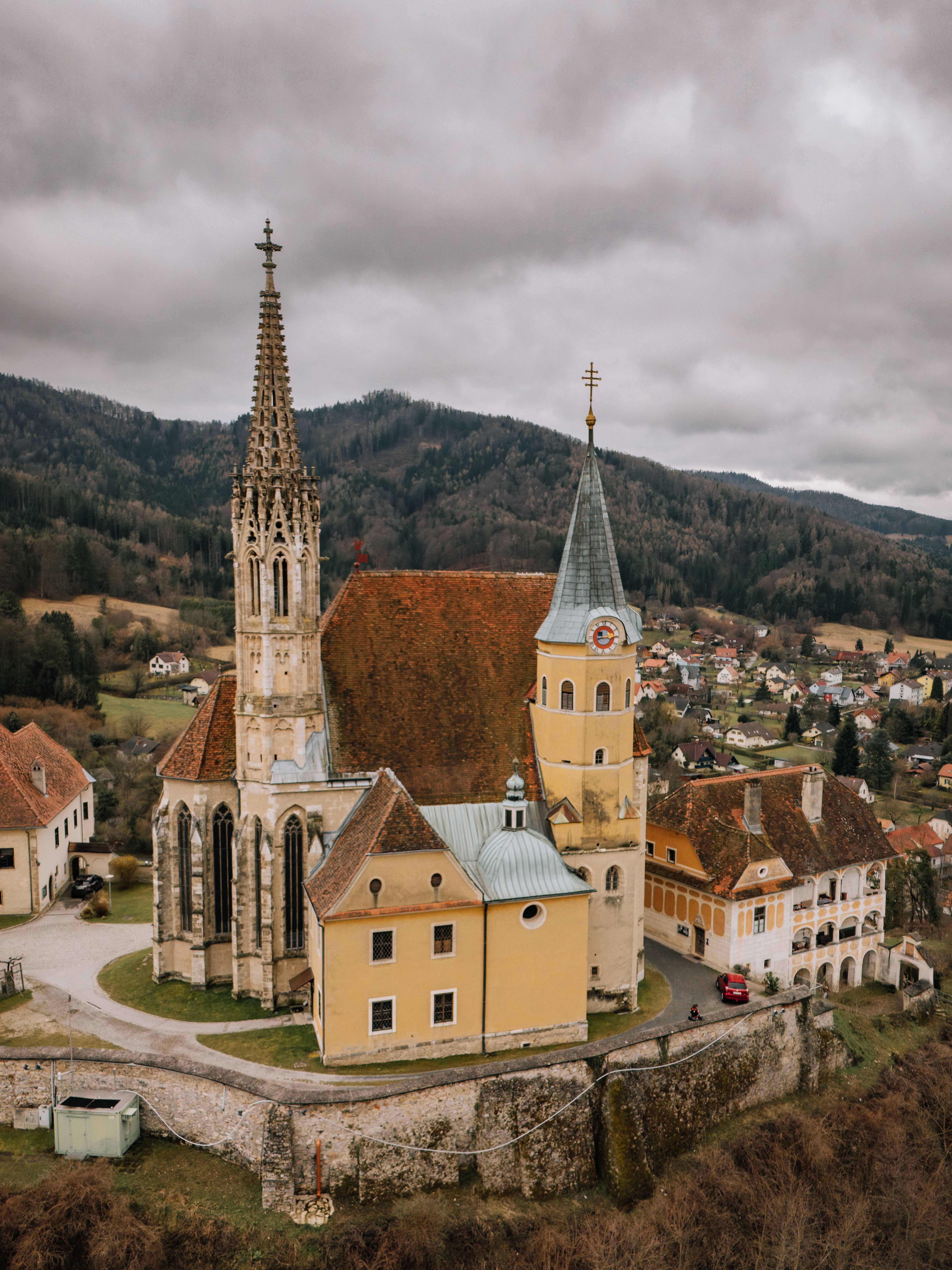 Aerial View of Historical Church in Austrian Countryside · Free Stock Photo