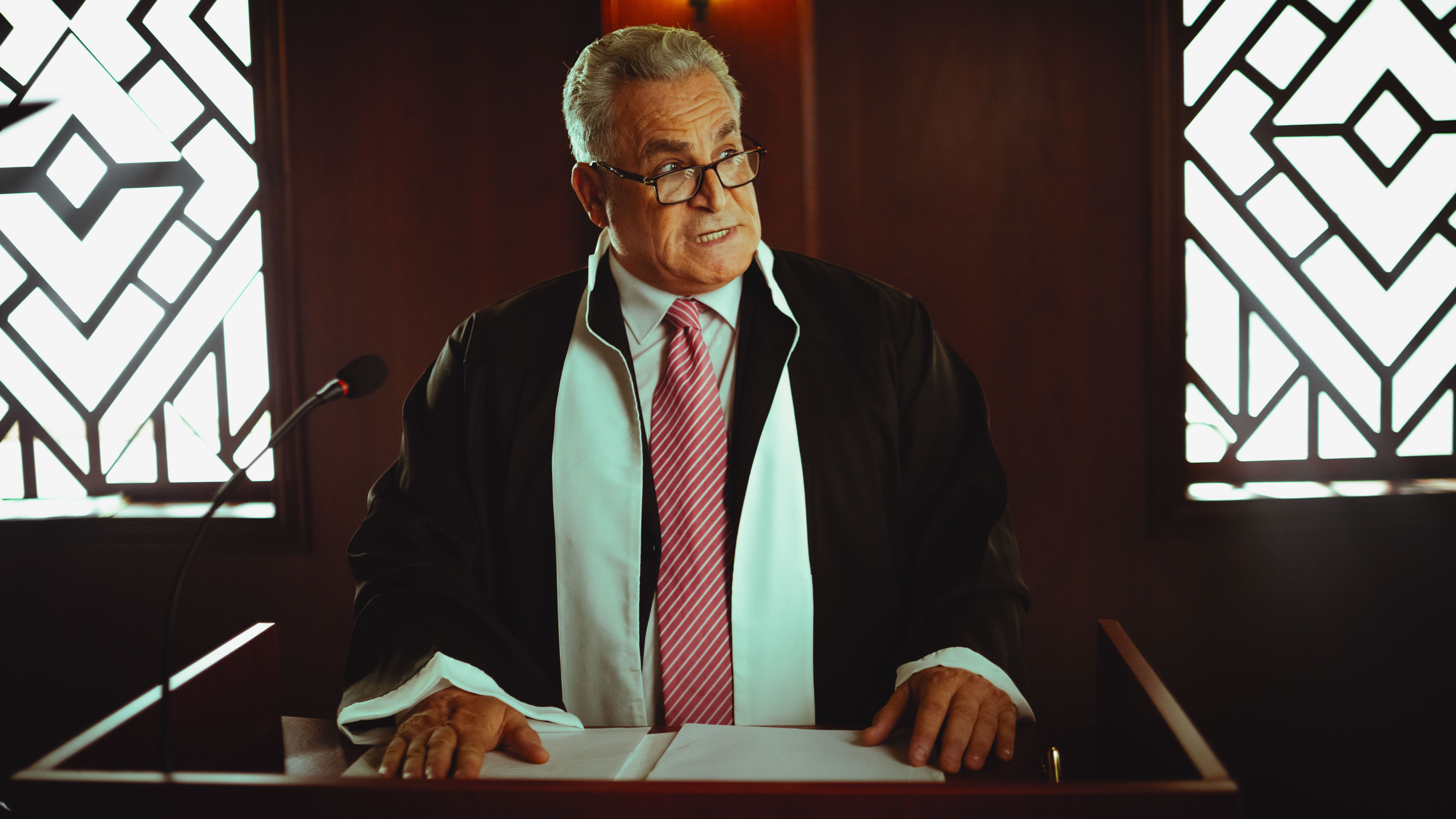 Senior Judge in Traditional Courtroom Robes · Free Stock Photo