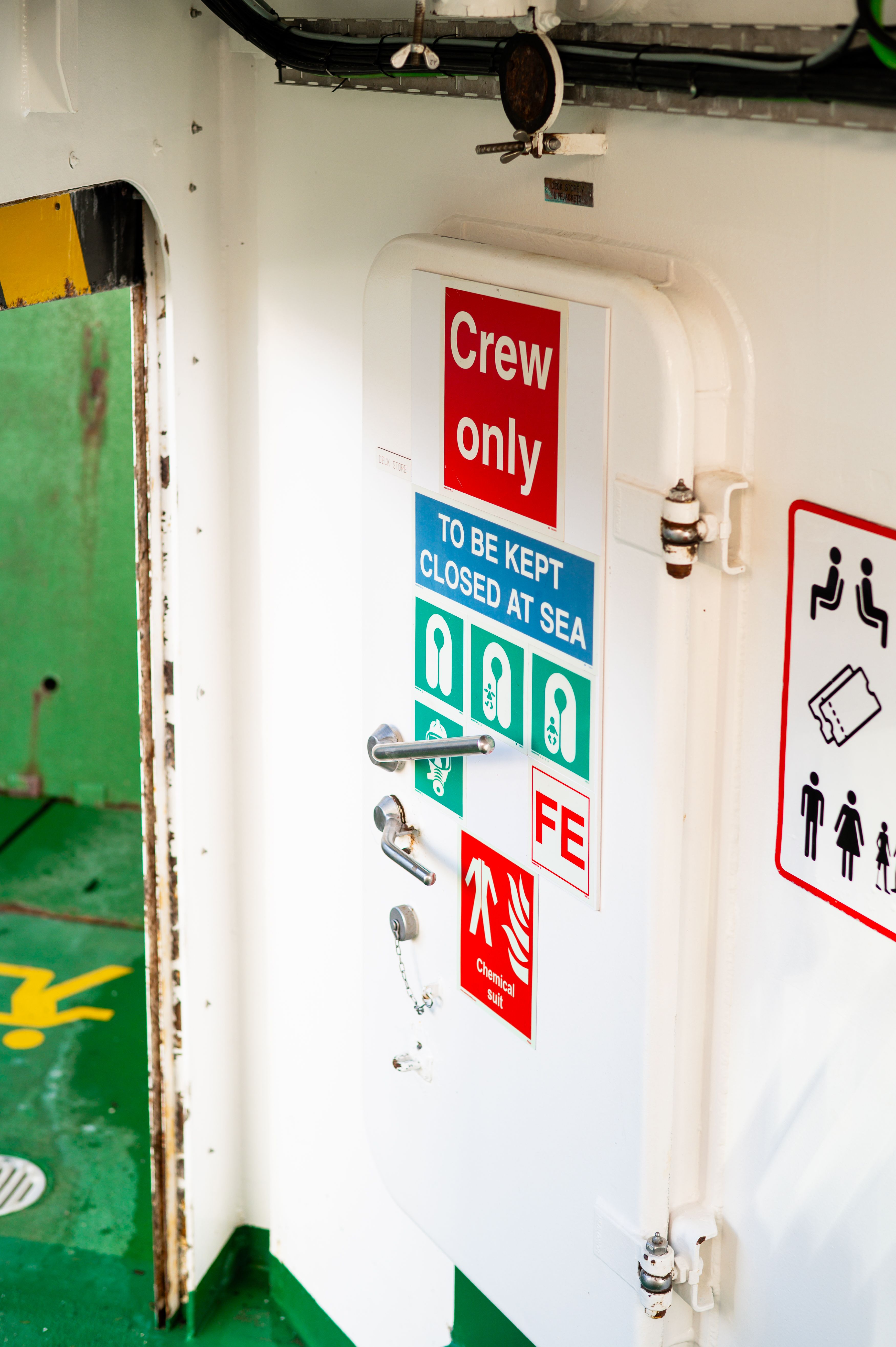 Crew Only Sign on a Ferry Door in Scotland · Free Stock Photo