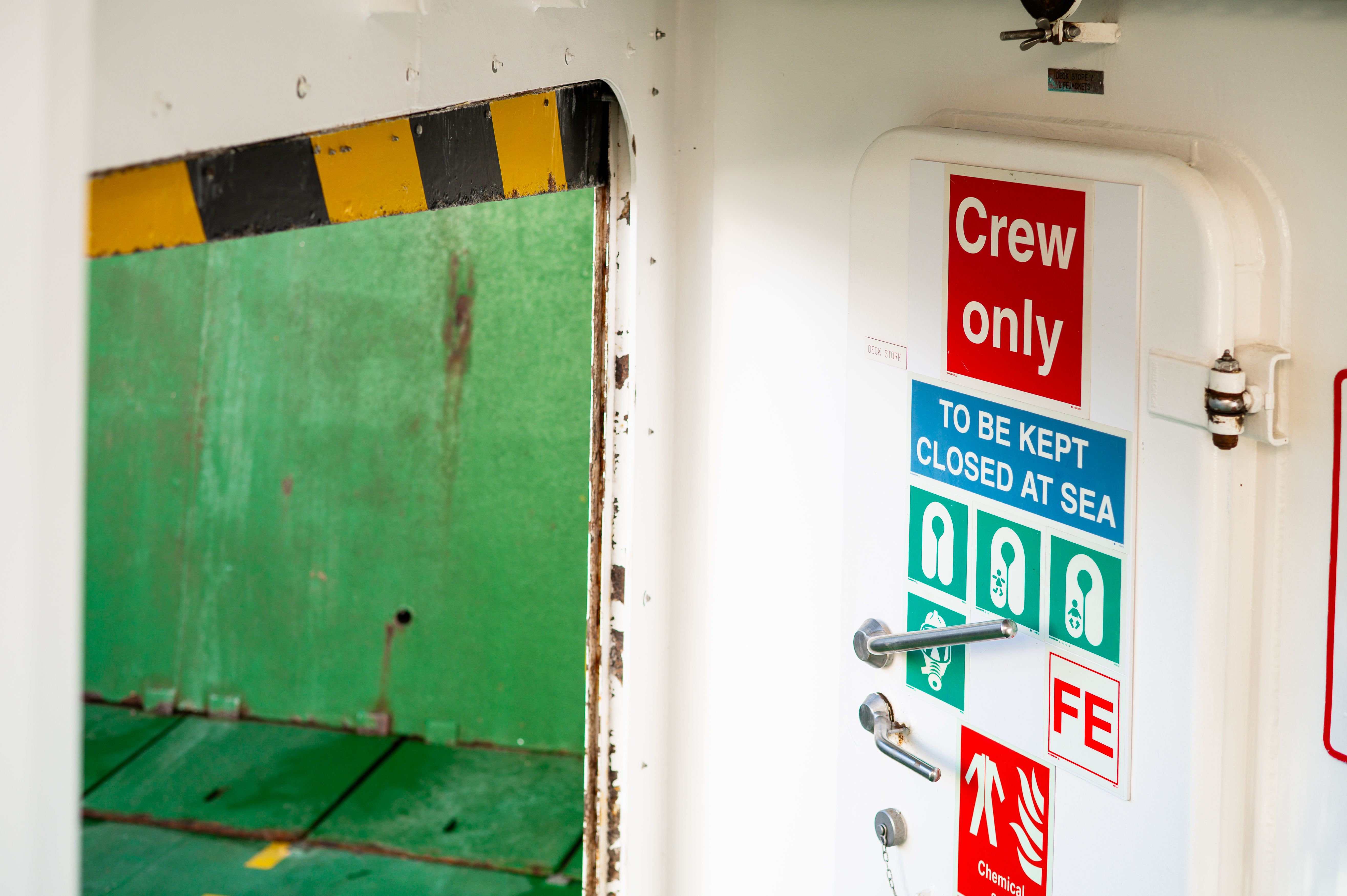 Crew Only Sign on a Ferry Door in Scotland · Free Stock Photo