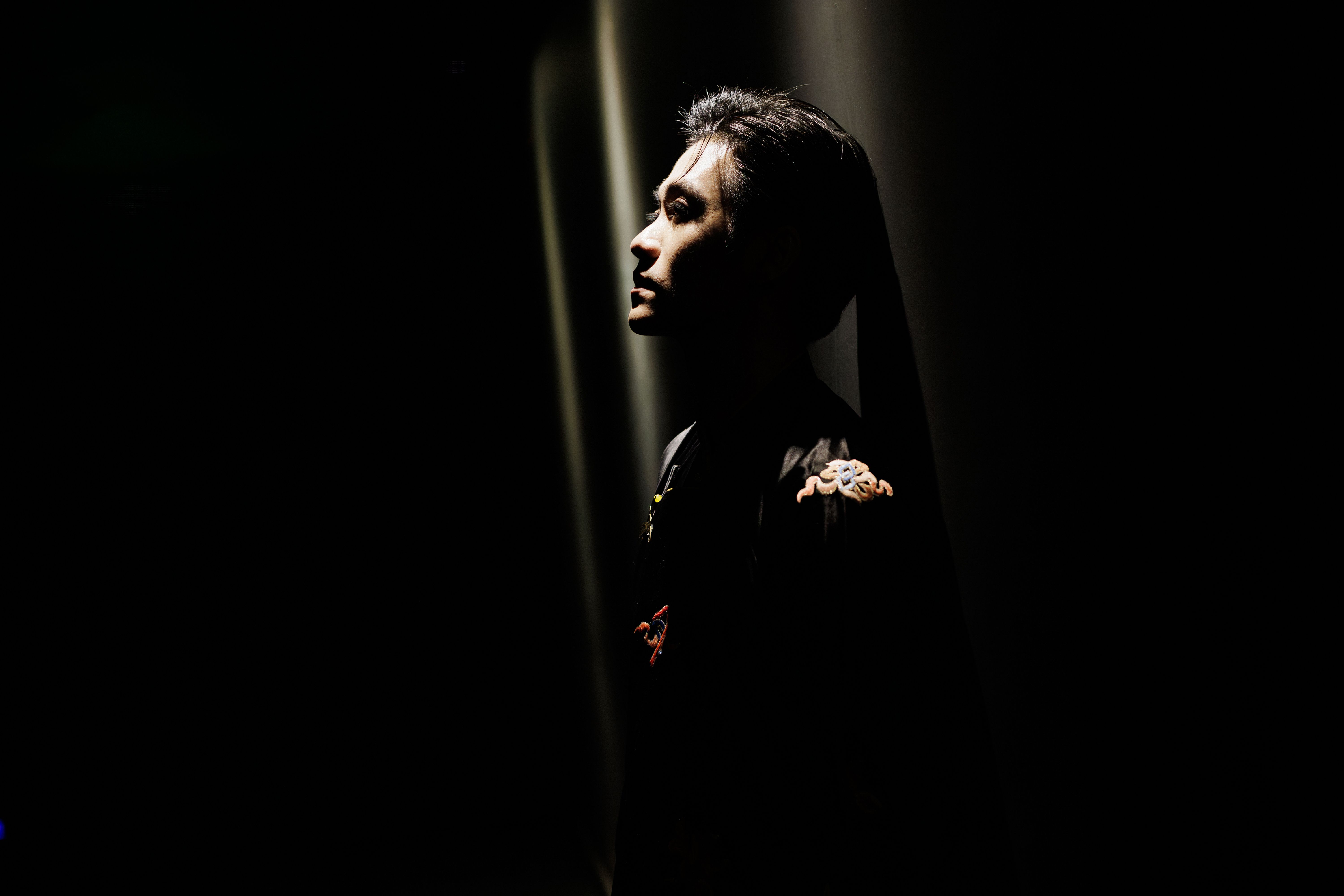 Profile Portrait in Dramatic Low Light Setting · Free Stock Photo