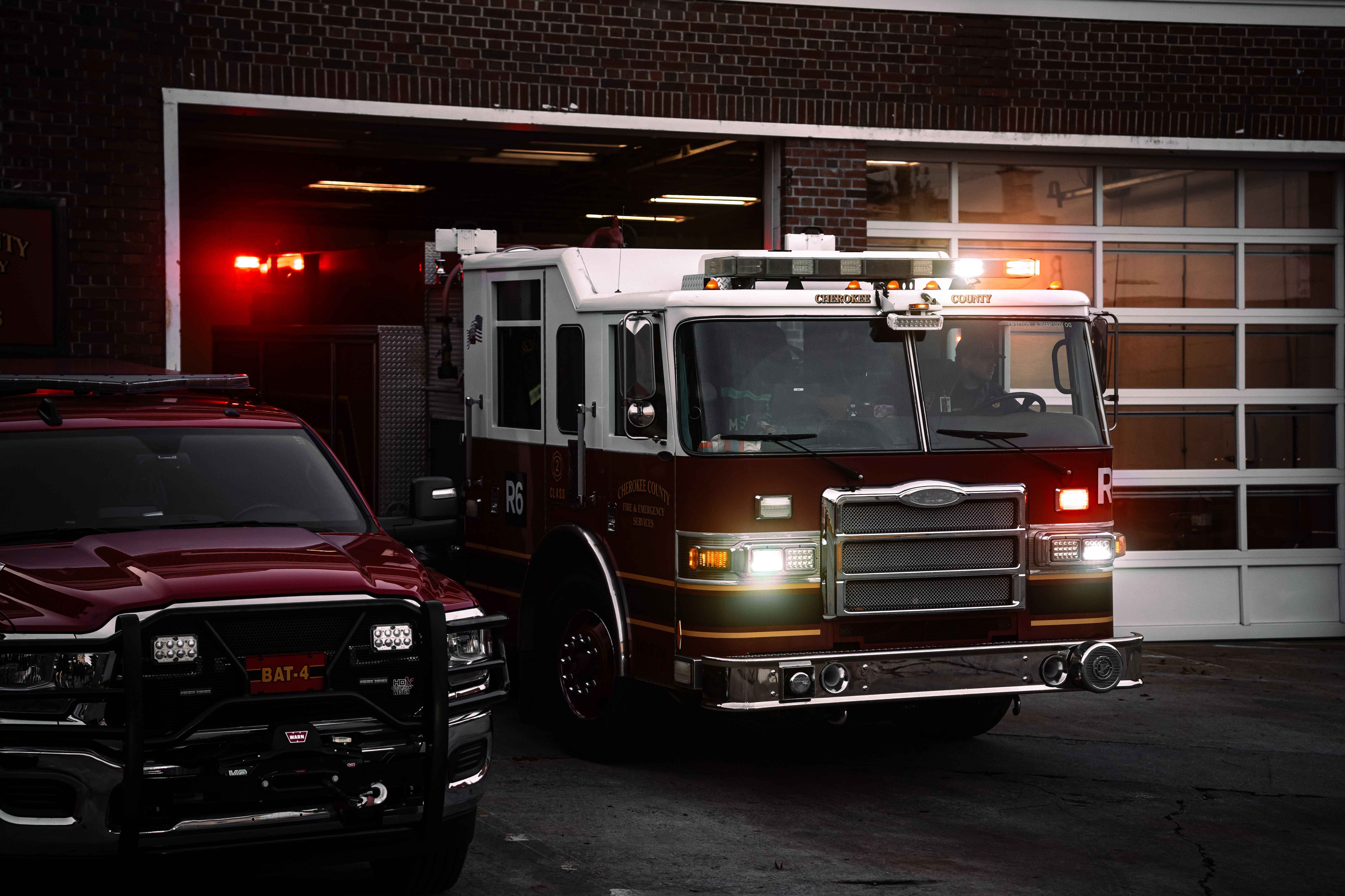 Fire Truck Responding from Station at Night · Free Stock Photo