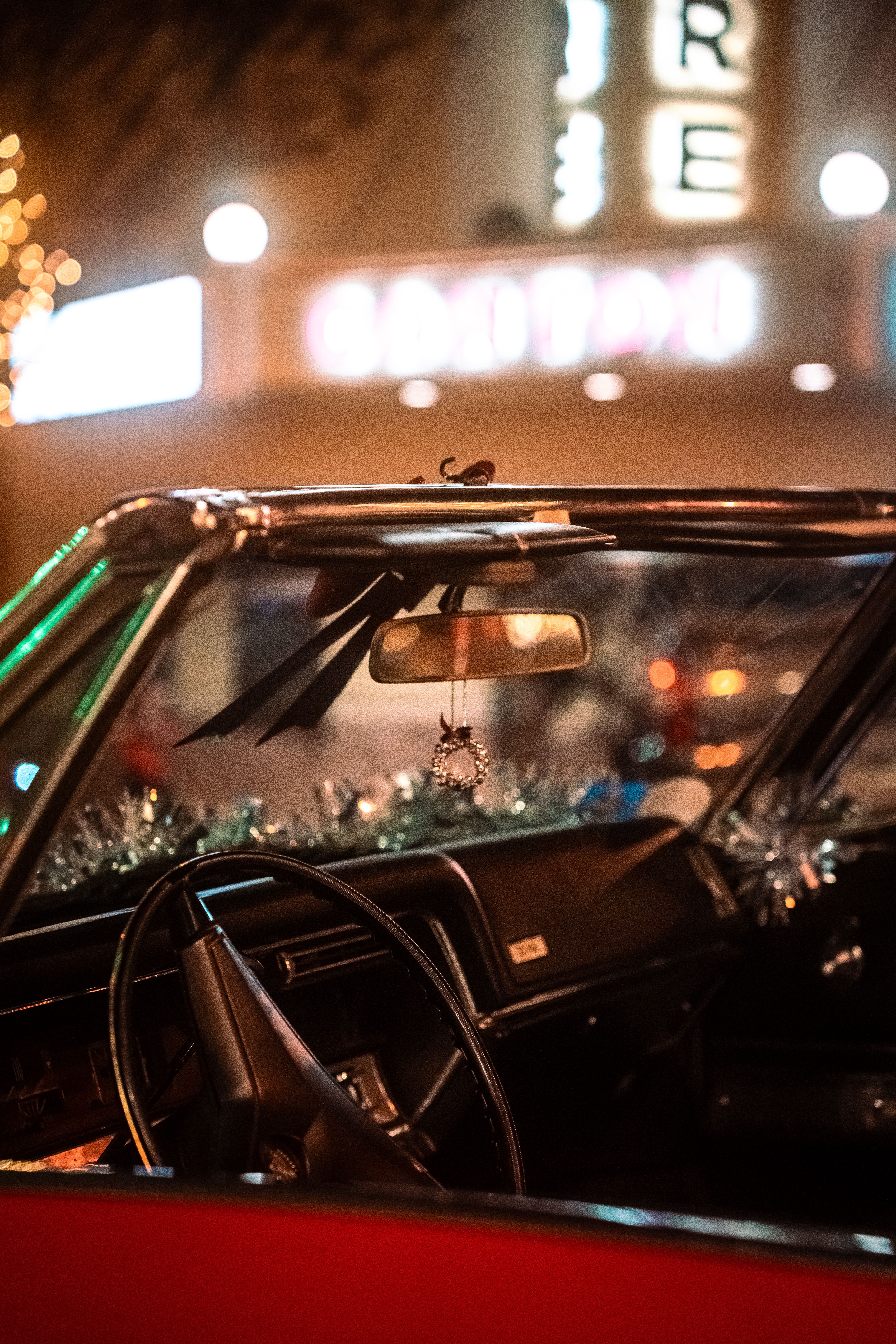 Vintage Car Interior at Night with Festive Decor · Free Stock Photo
