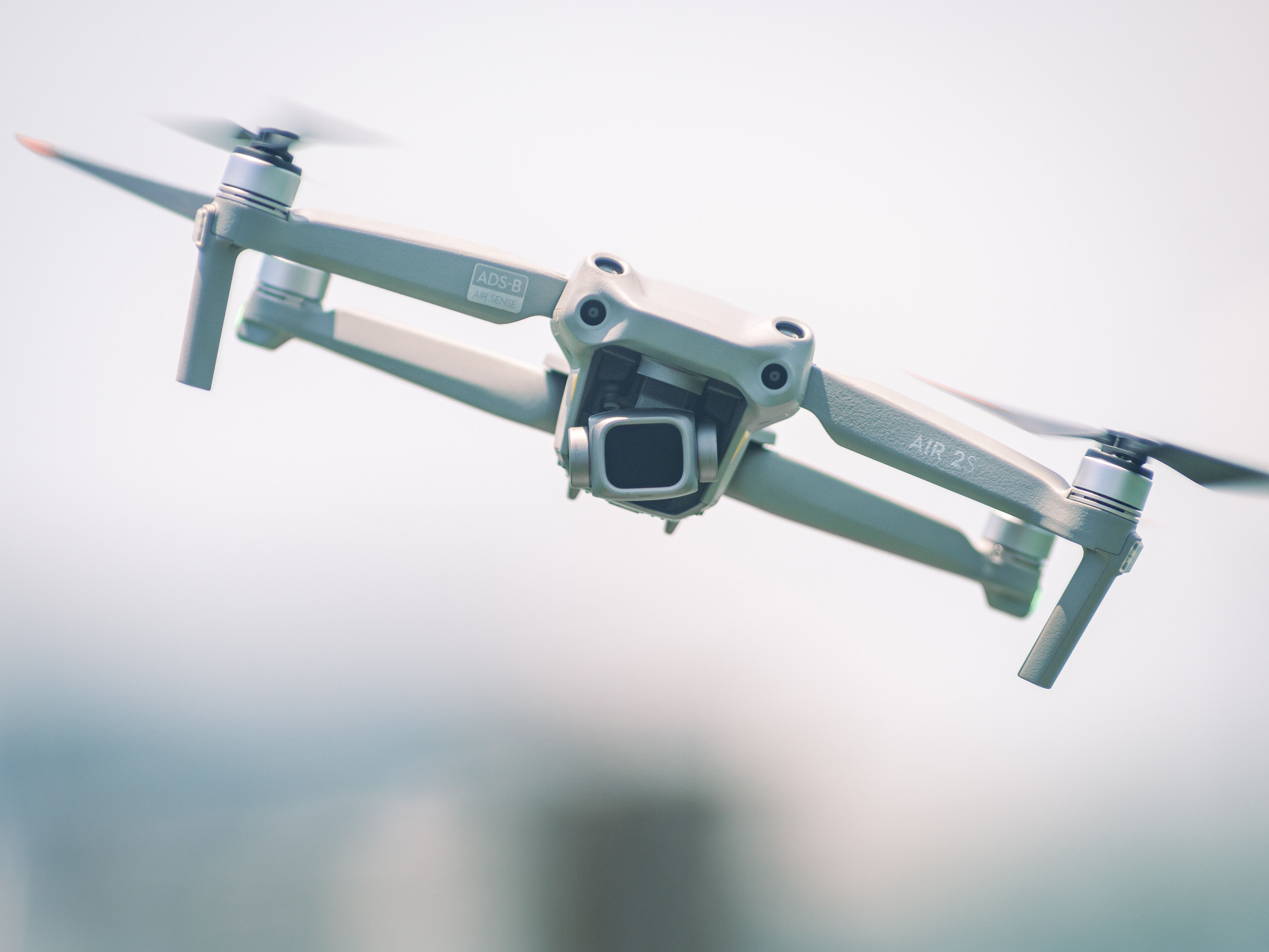 High-Tech Drone Flying in Clear Sky · Free Stock Photo