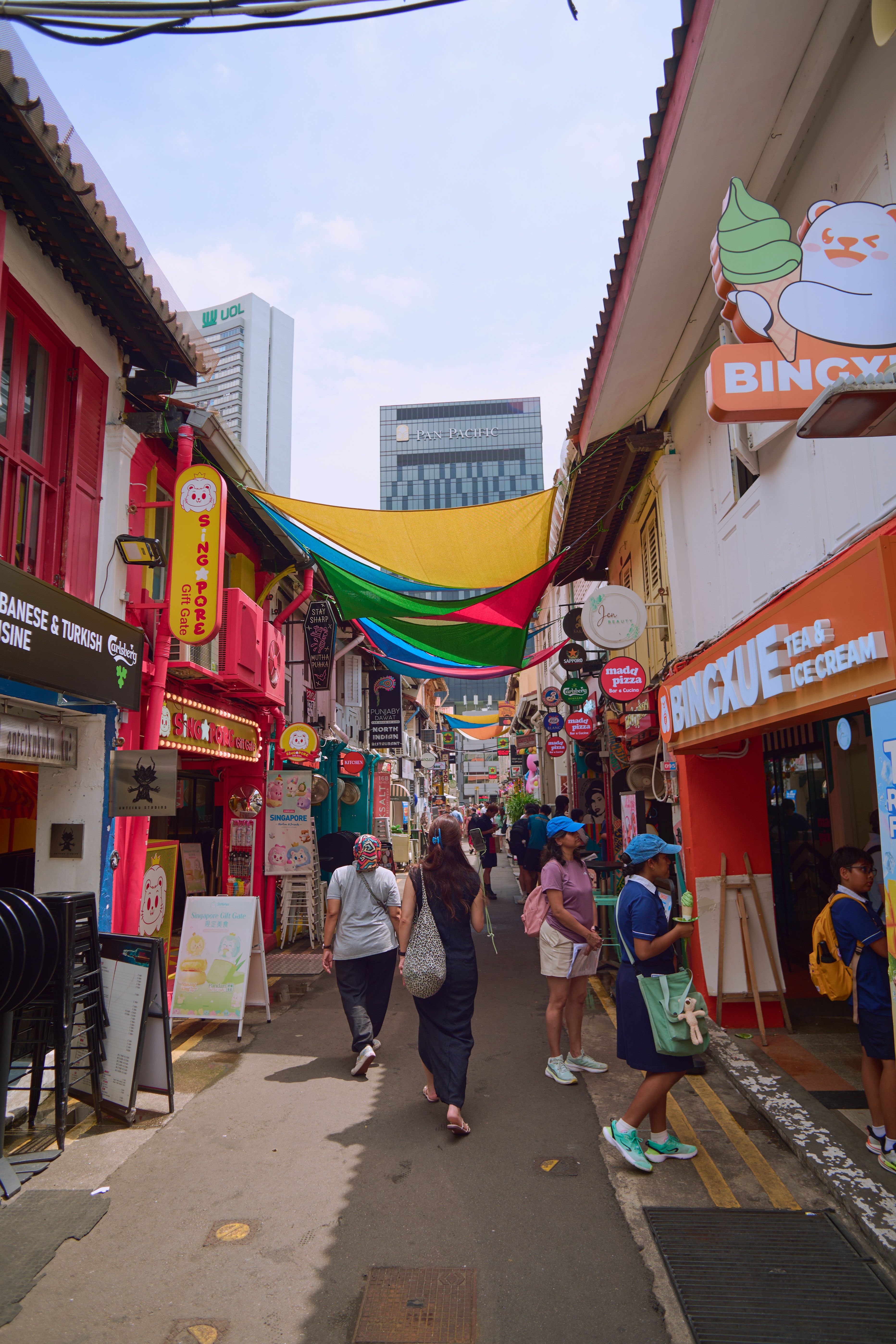 Colorful Street Market Scene in Singapore · Free Stock Photo