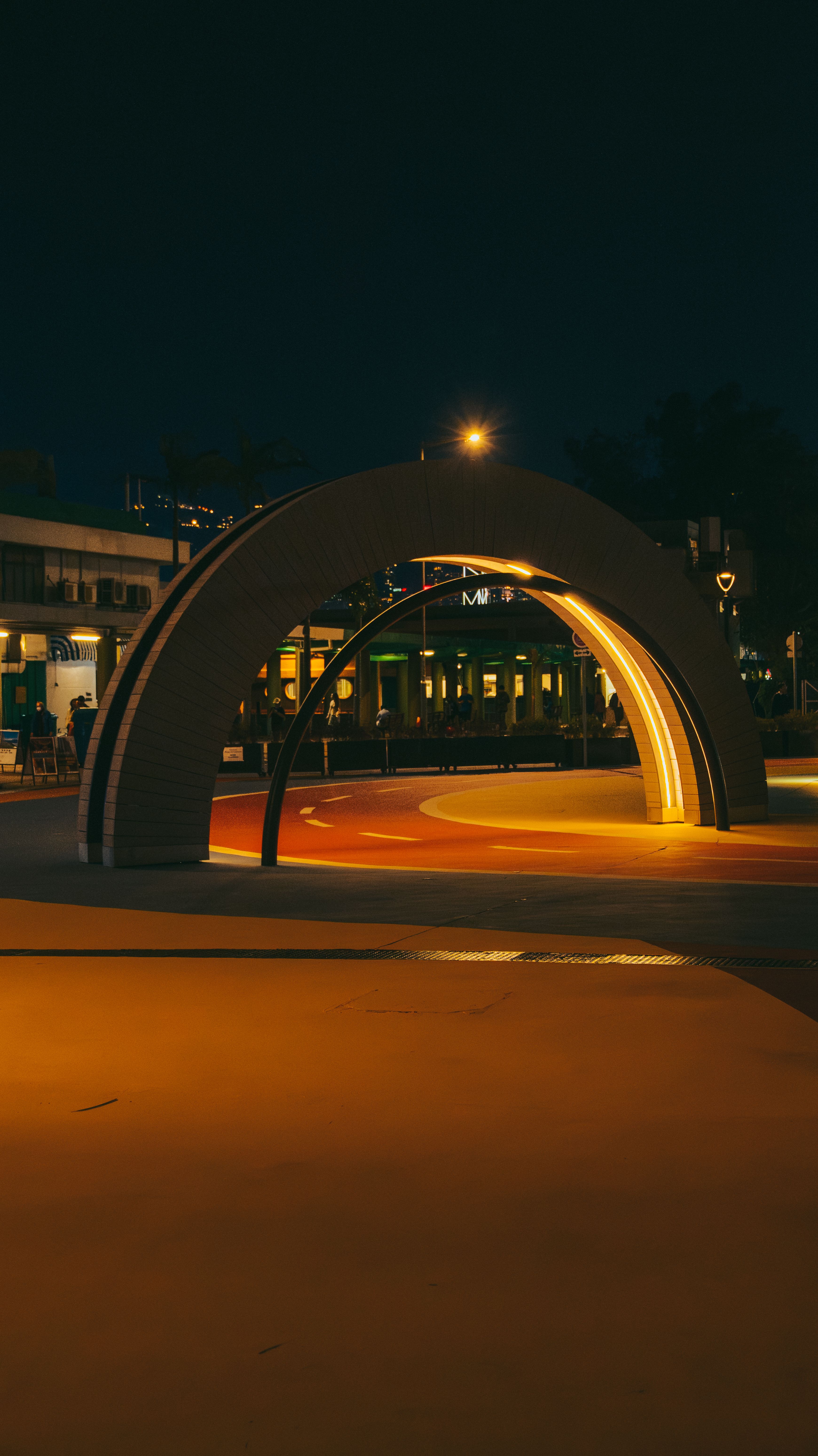Modern Architectural Structure Illuminated at Night · Free Stock Photo