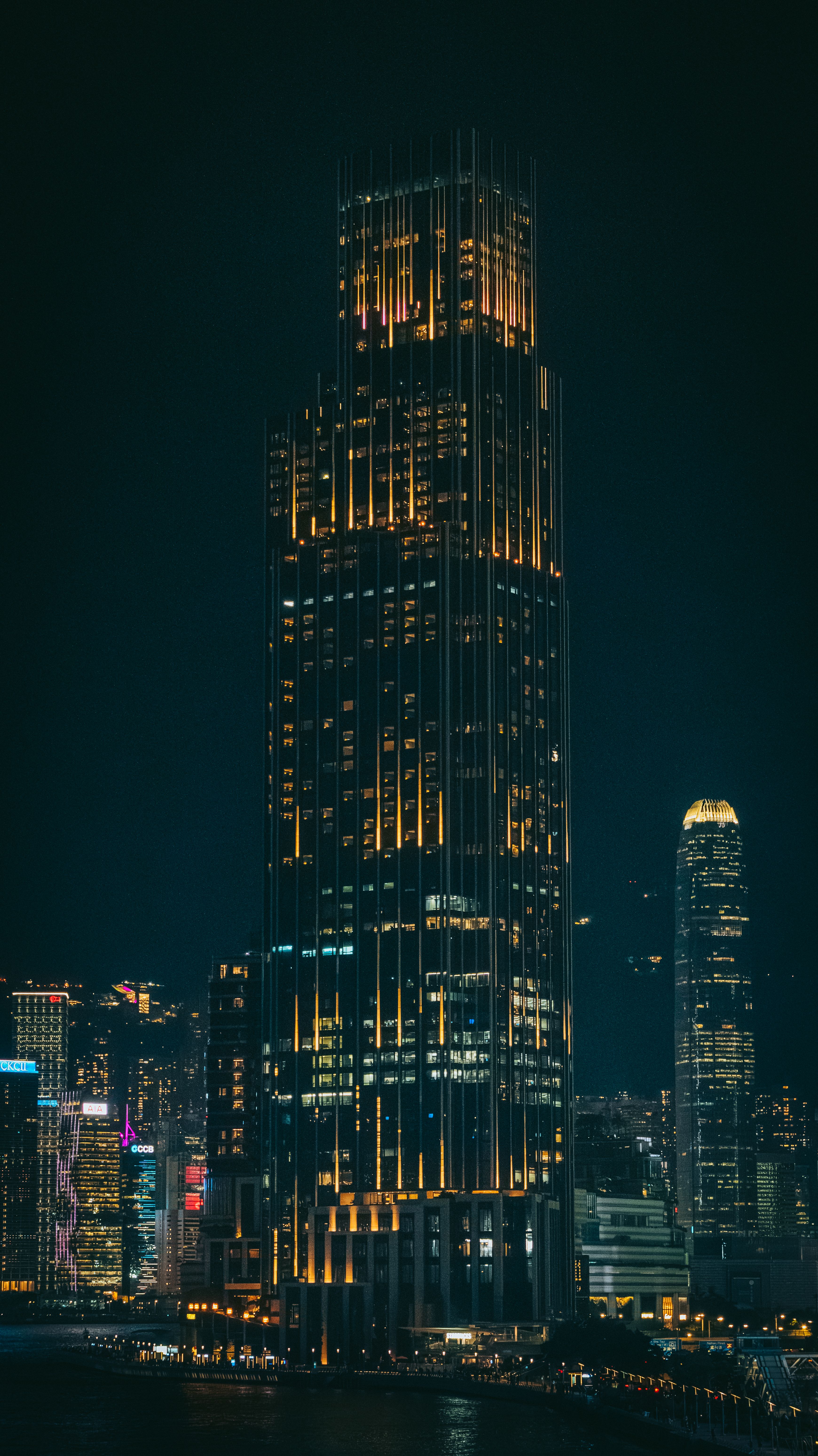 Skyscraper Illuminated at Night in Cityscape · Free Stock Photo