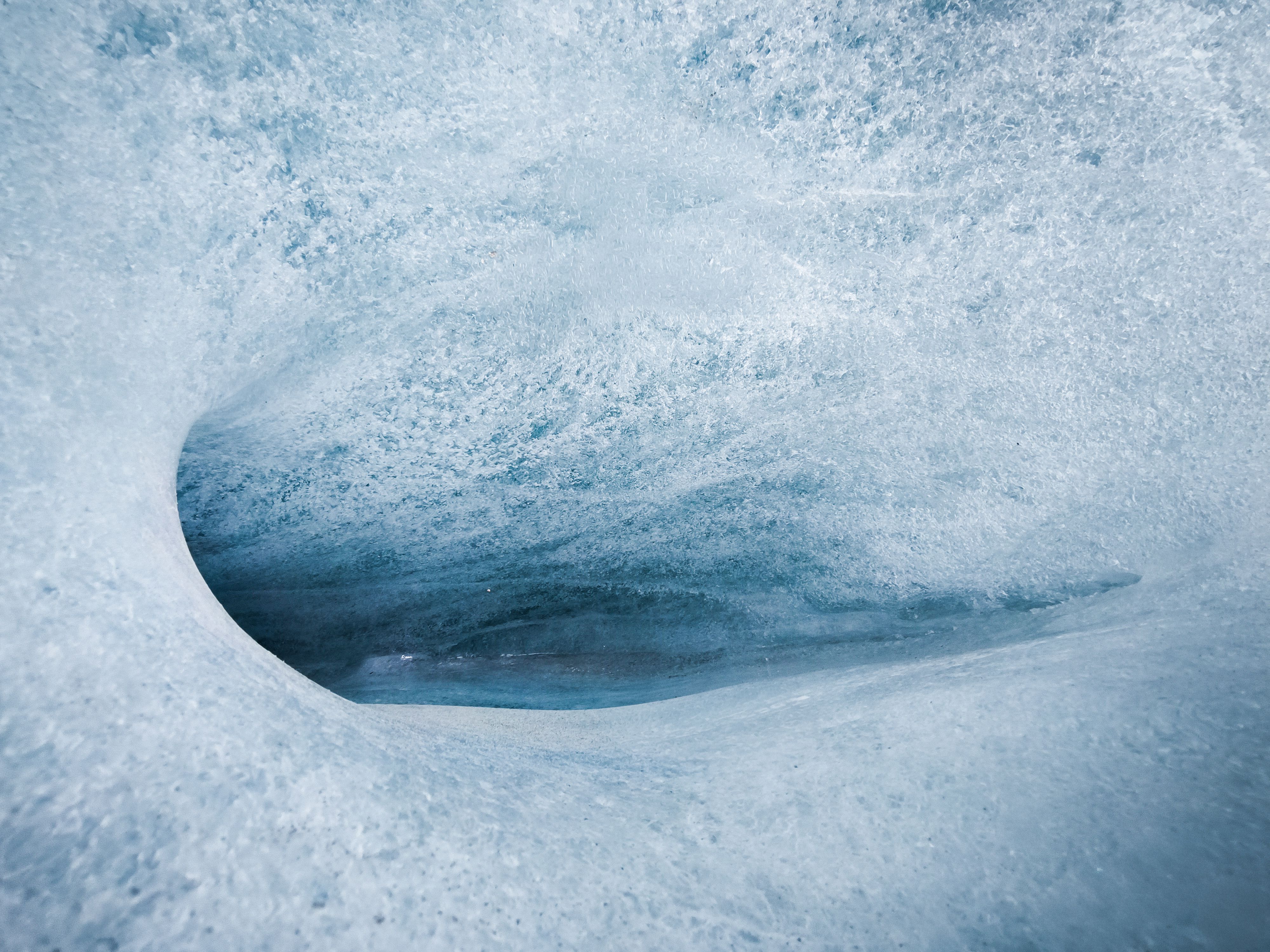 Captivating Ice Tunnel with Textured Walls · Free Stock Photo