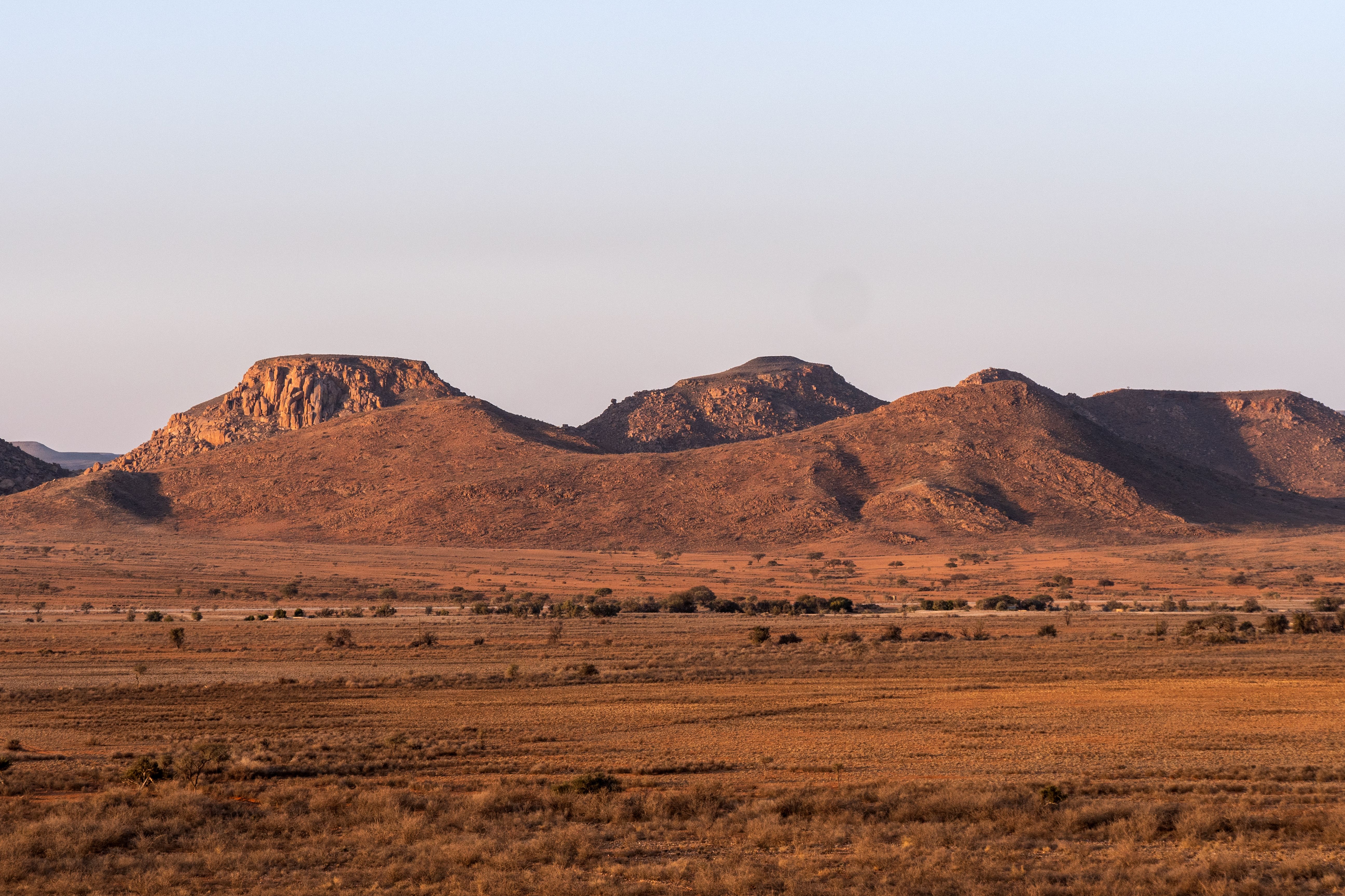 Desert Landscape with Mountains and Hills in Distance · Free Stock Photo