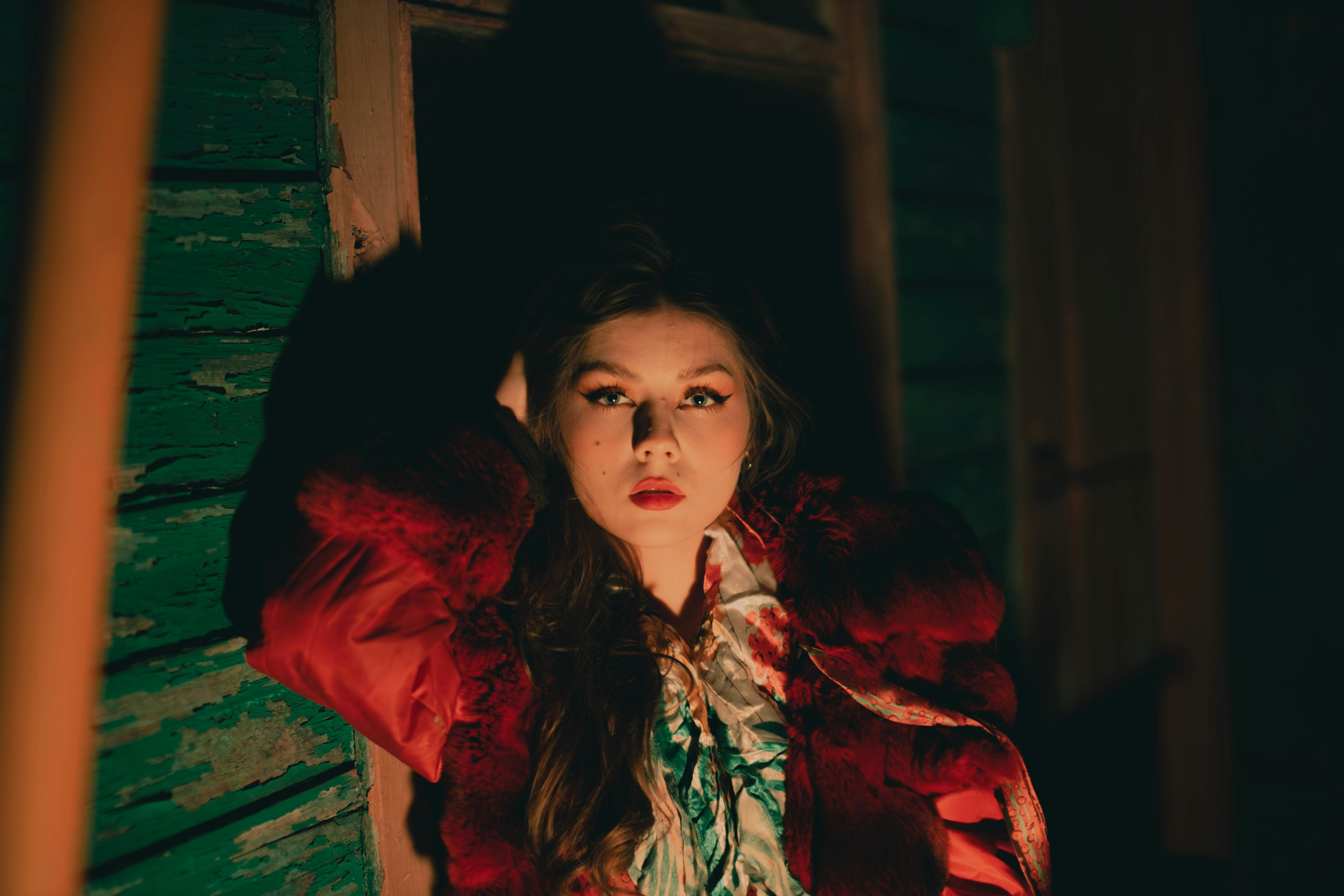 Dramatic Portrait at Night with Warm Lighting · Free Stock Photo