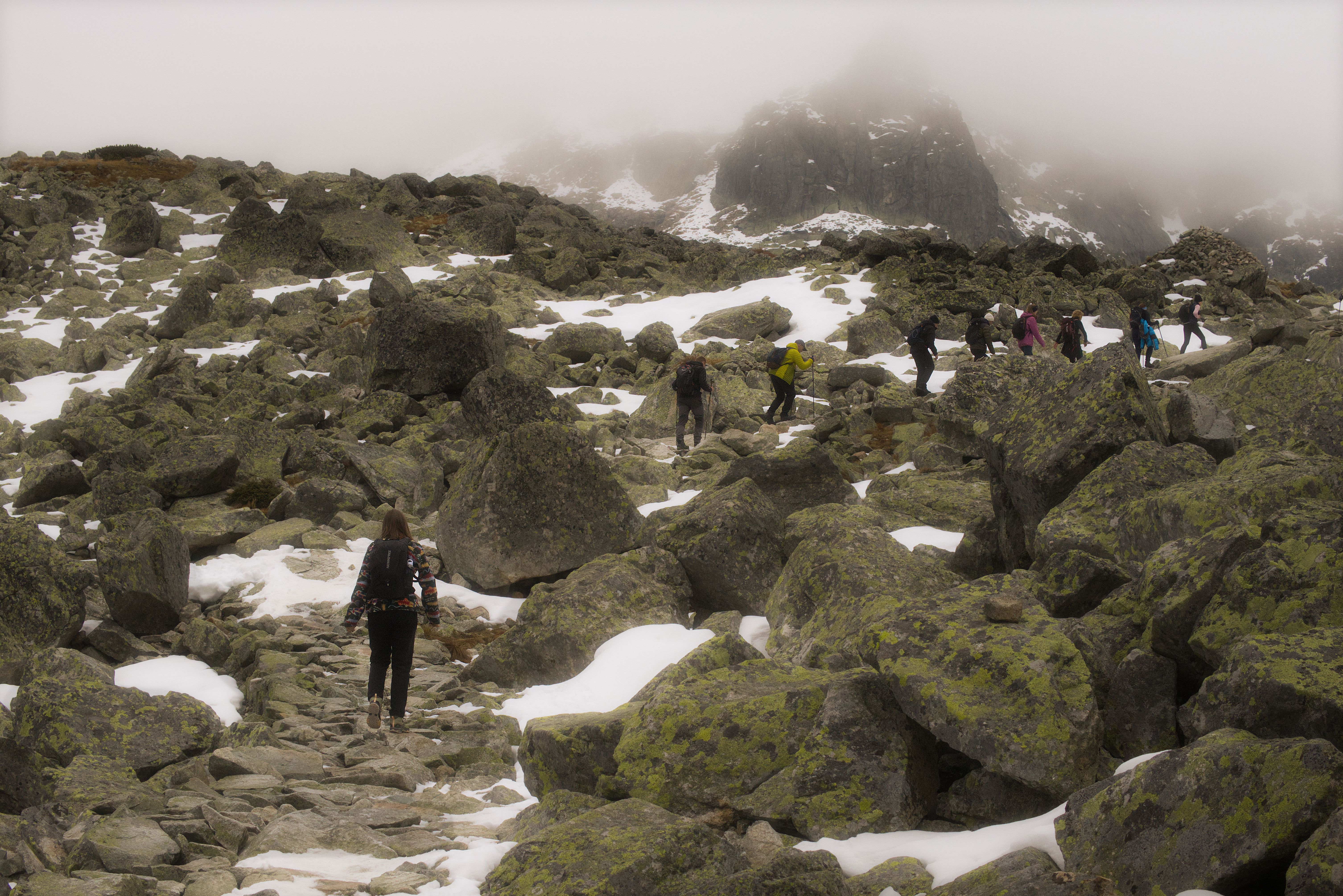 Hikers Traverse Rocky Tatra Mountains in Slovakia · Free Stock Photo