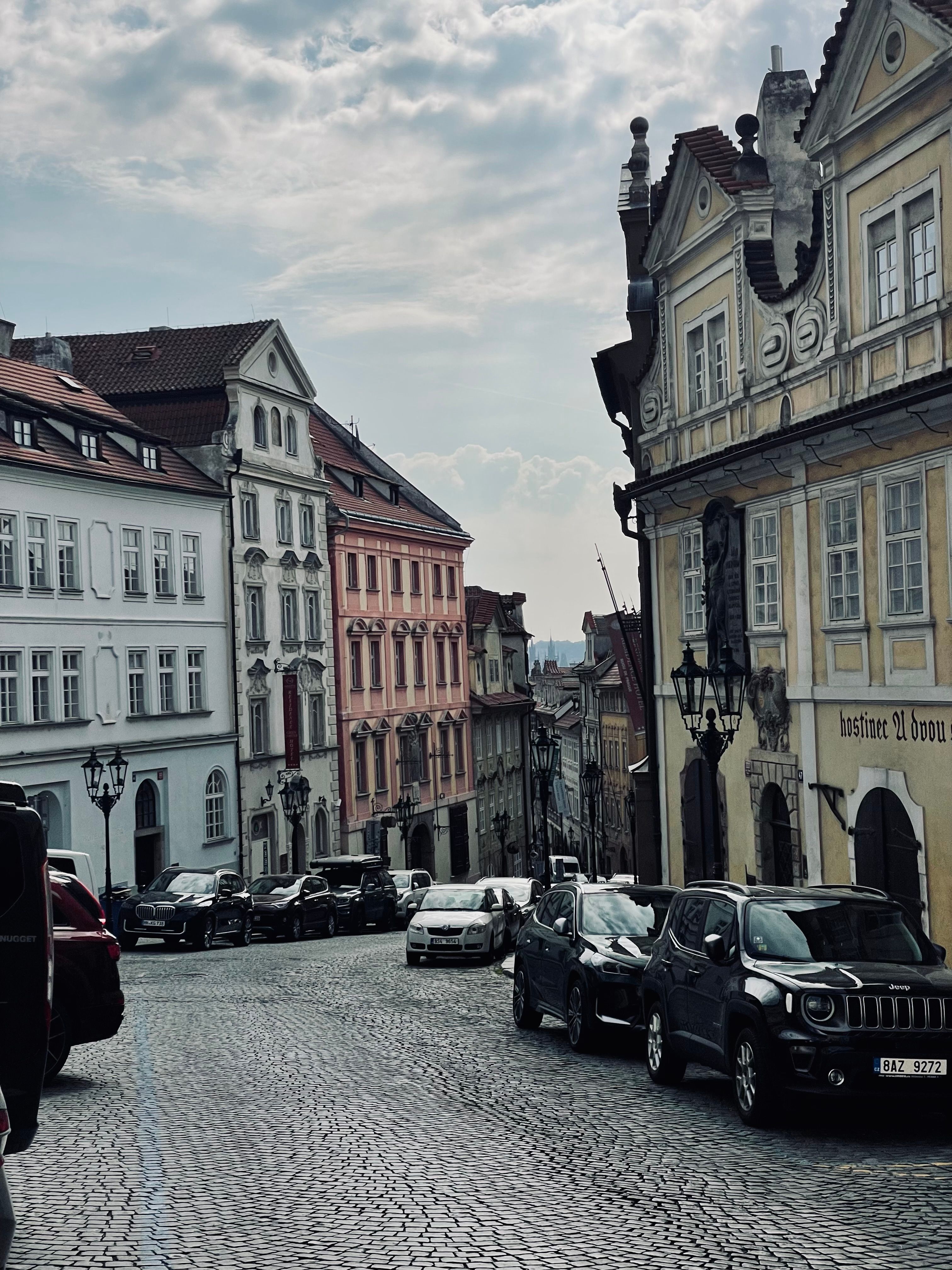 Scenic cobblestone street in historic European city · Free Stock Photo
