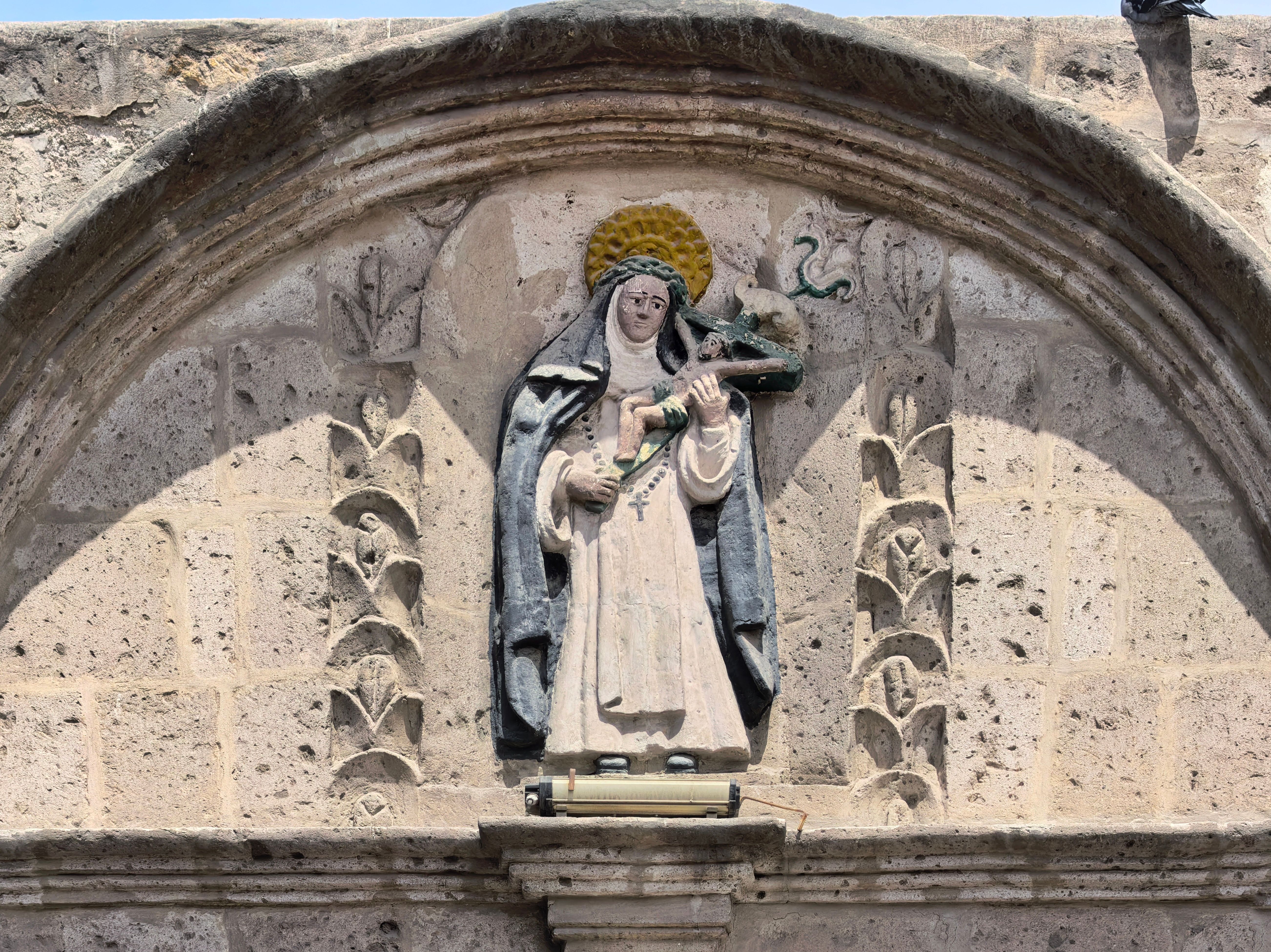 Historic Religious Stone Carving on Cathedral Façade · Free Stock Photo