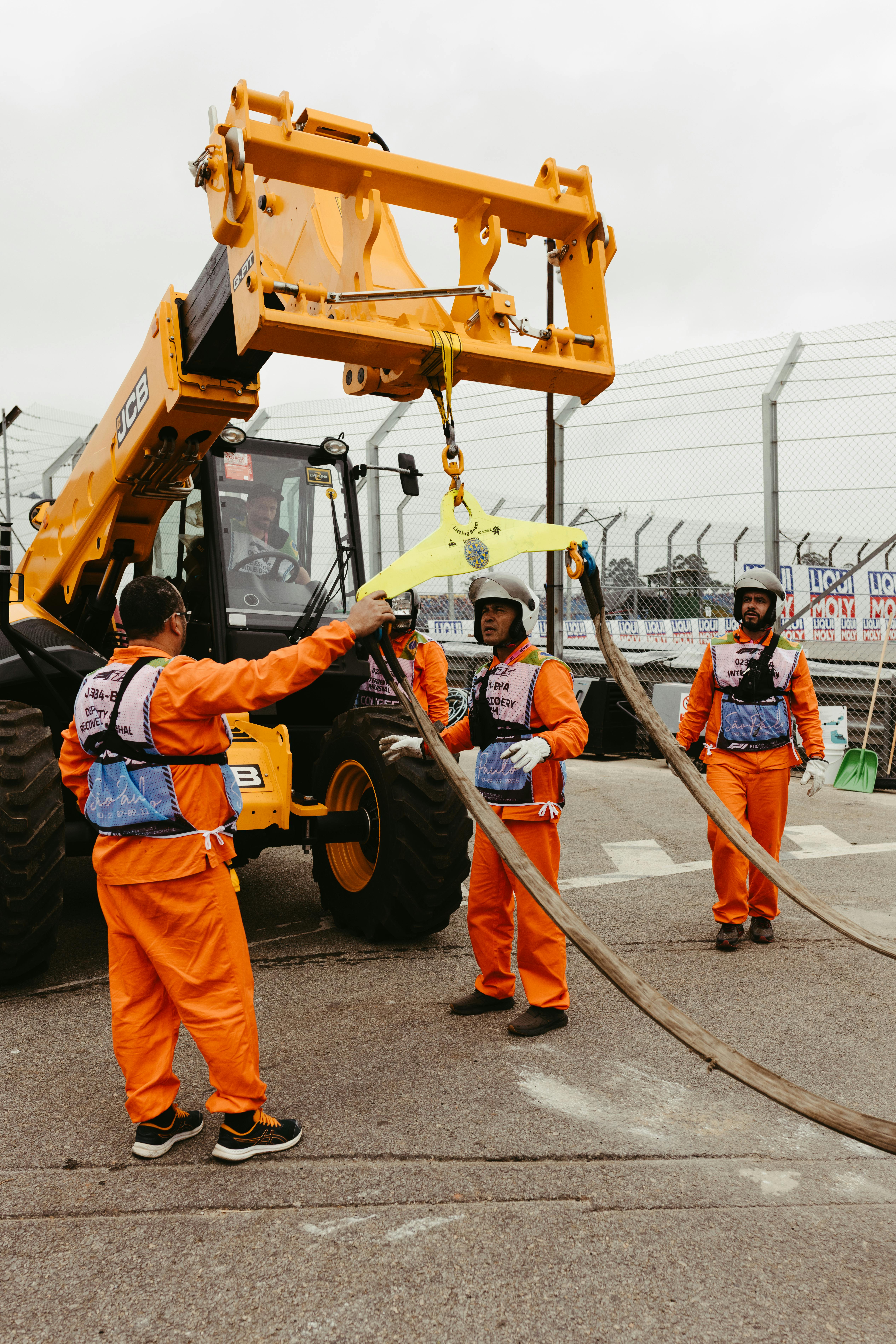 Track Officials Preparing Equipment at São Paulo Racing Event · Free ...
