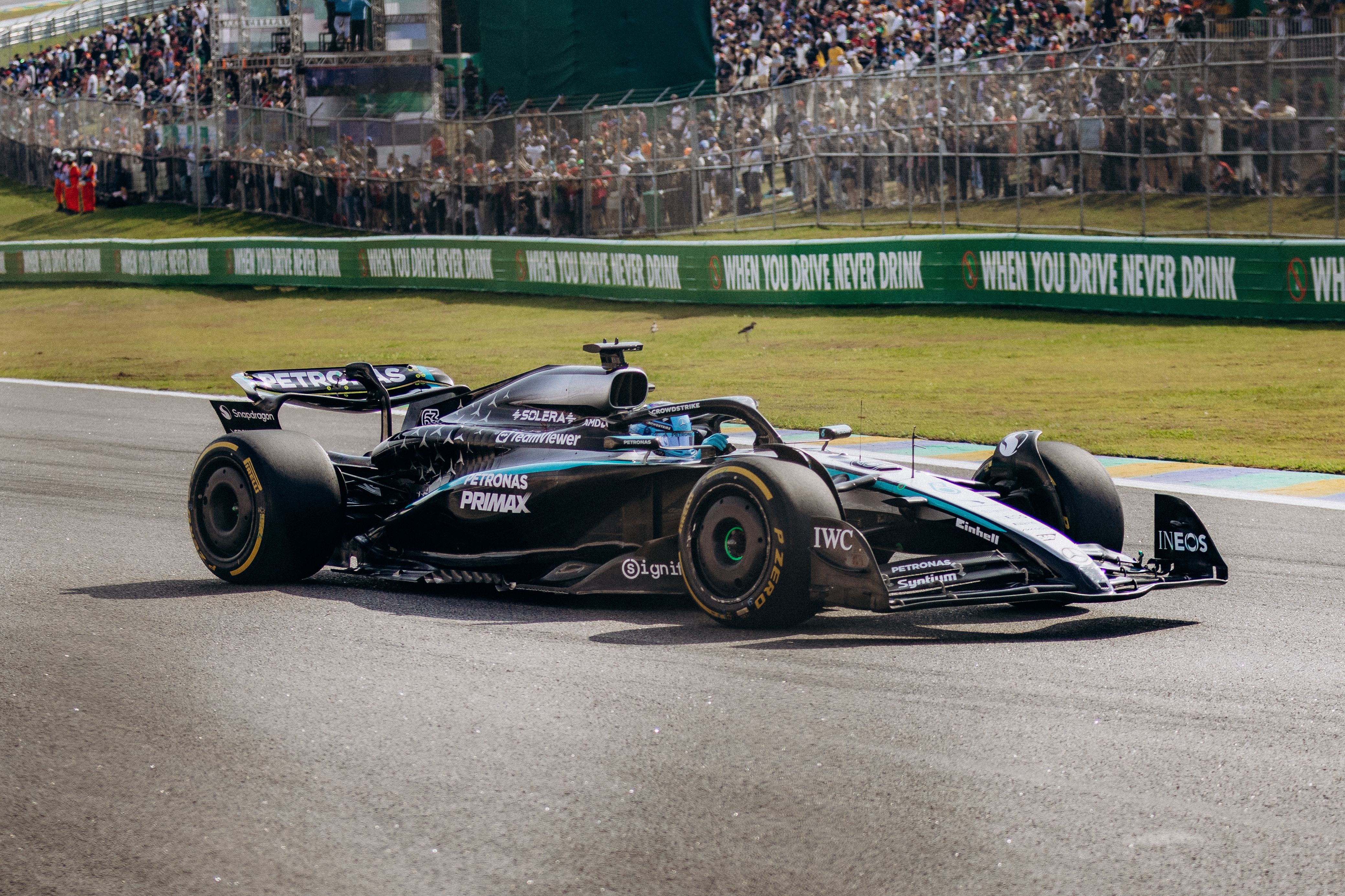 High-Speed Formula 1 Car Racing at Interlagos · Free Stock Photo