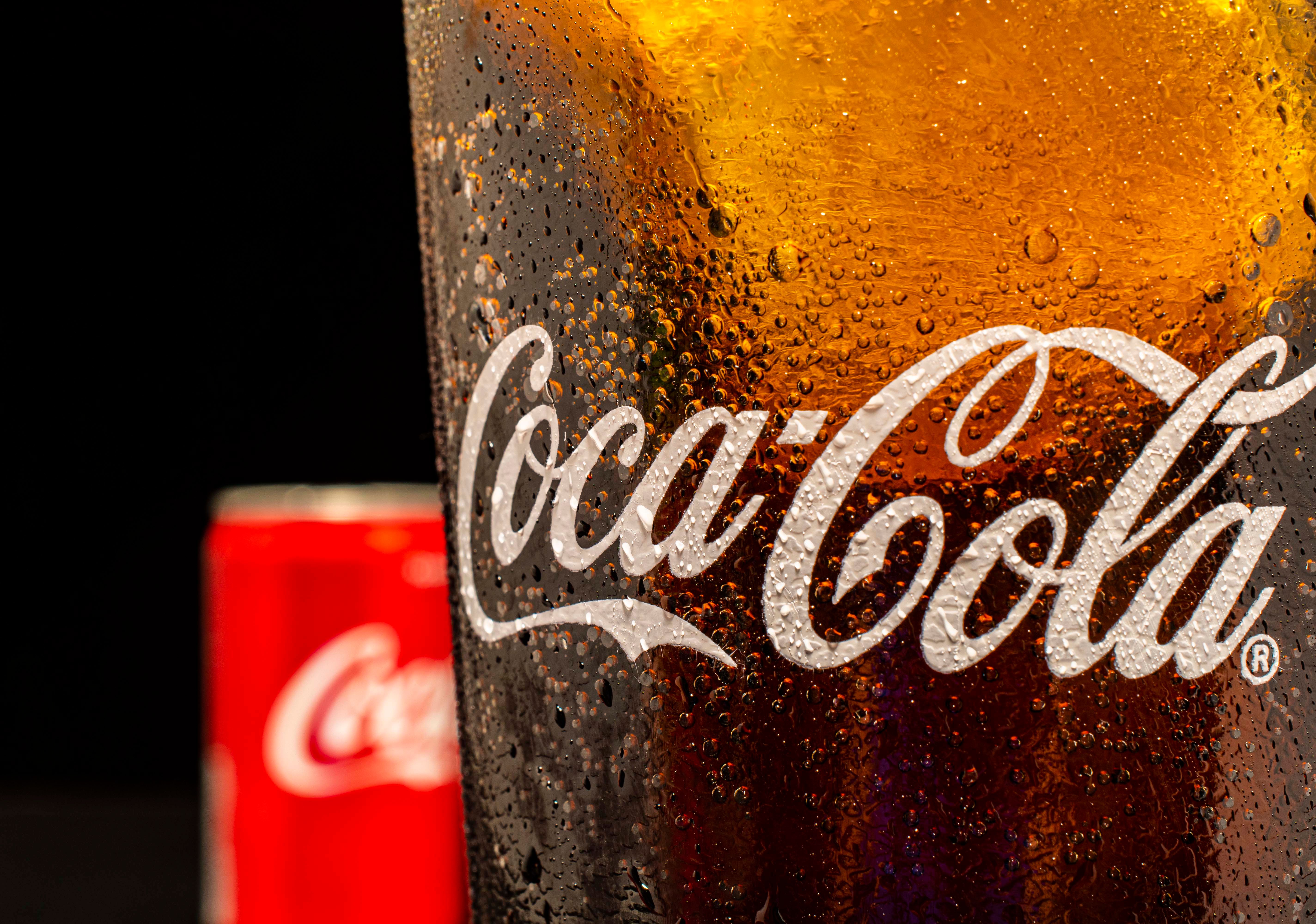Various glass bottles of sweet refreshing coke · Free Stock Photo