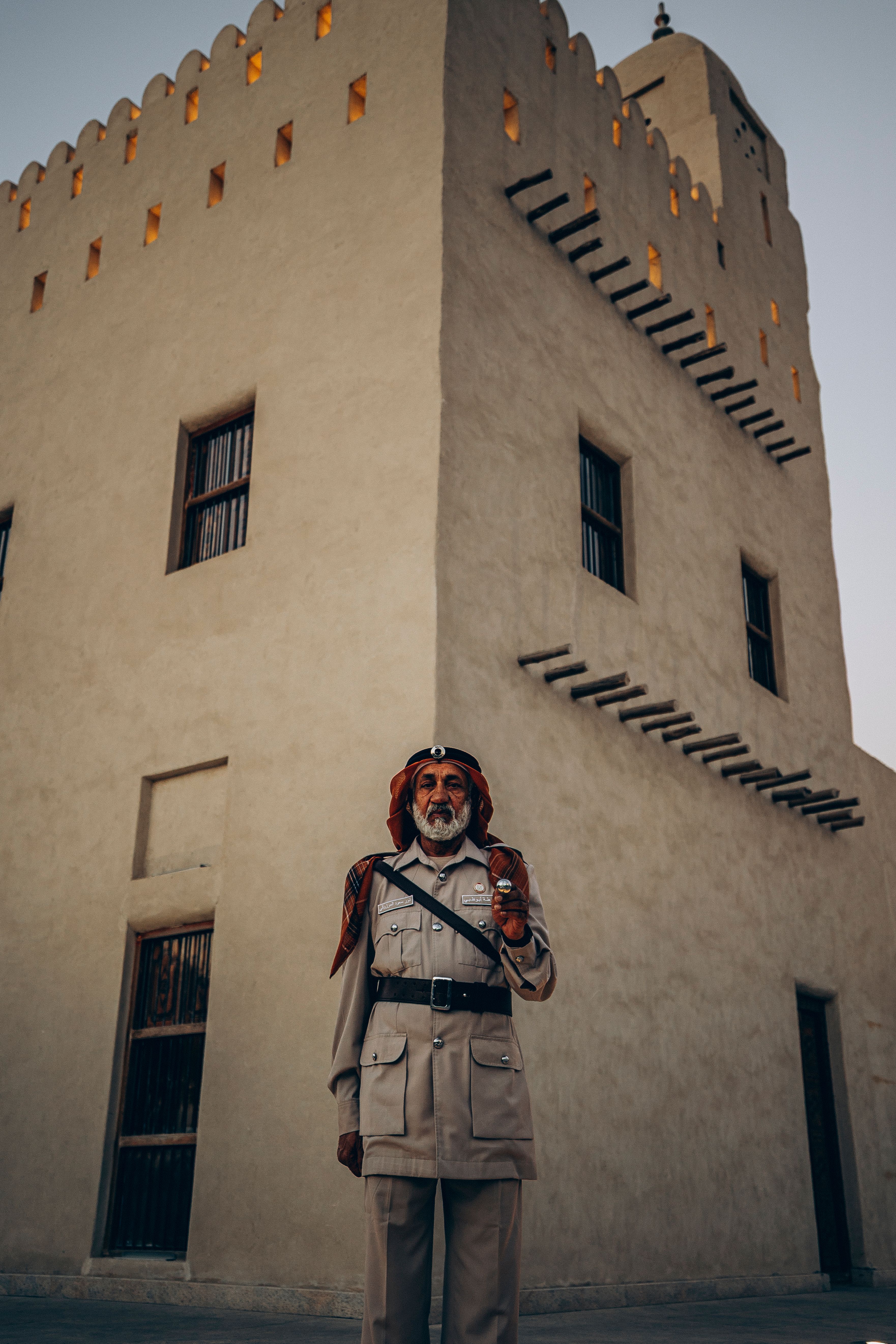 Traditional Emirati Police Officer in Abu Dhabi · Free Stock Photo