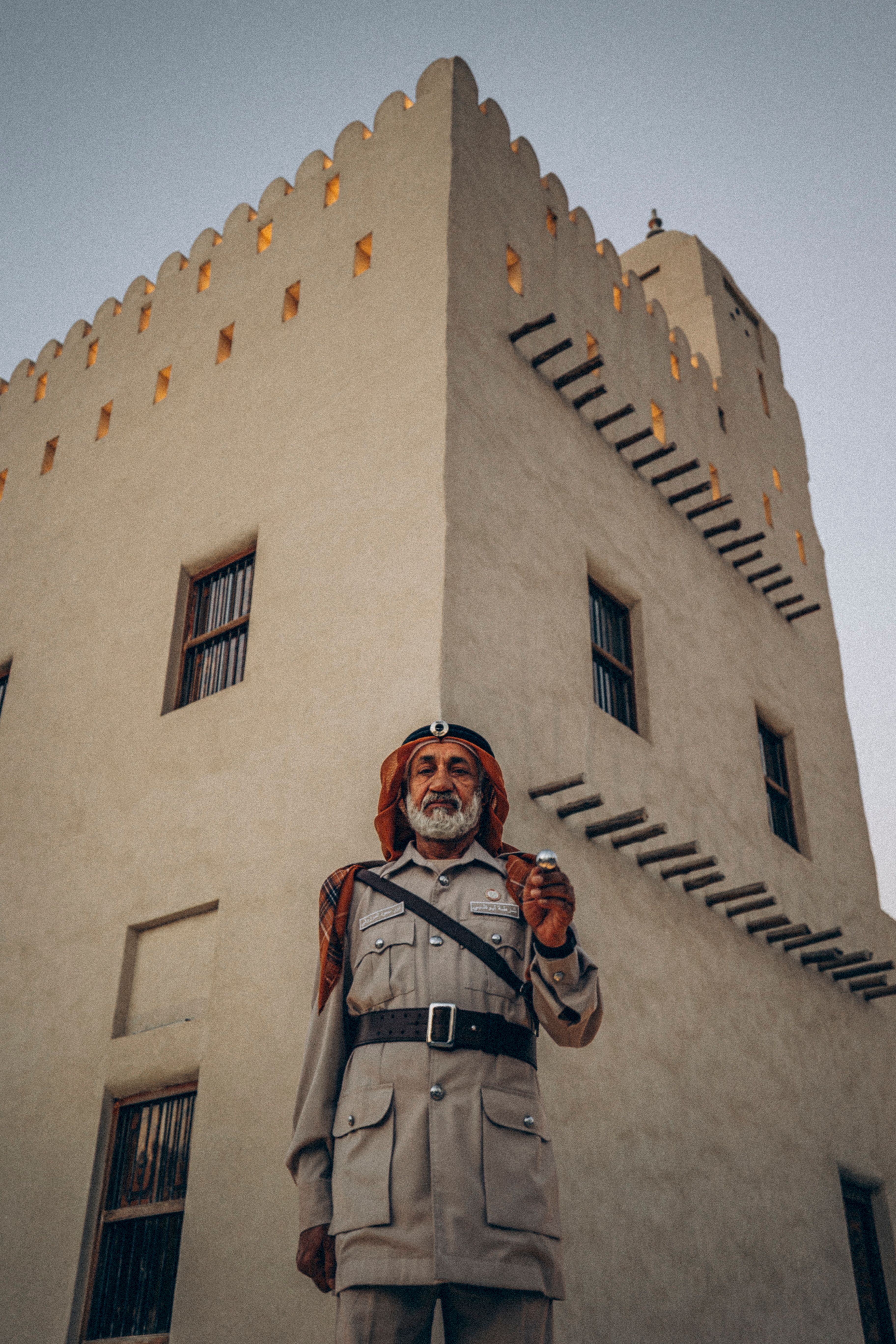 Traditional Emirati Guard at Historic Fort · Free Stock Photo