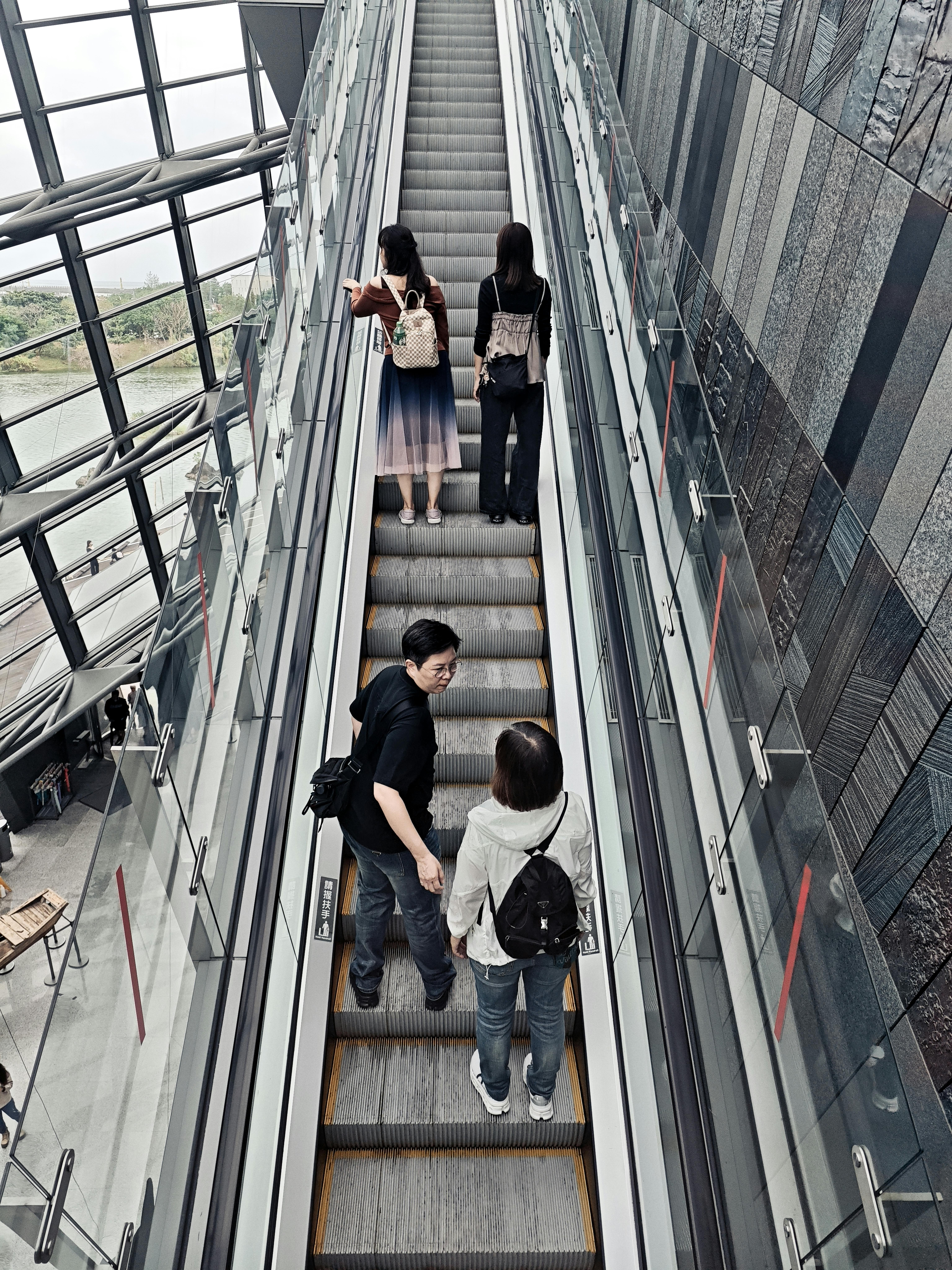 Modern Indoor Escalator with People in Motion · Free Stock Photo