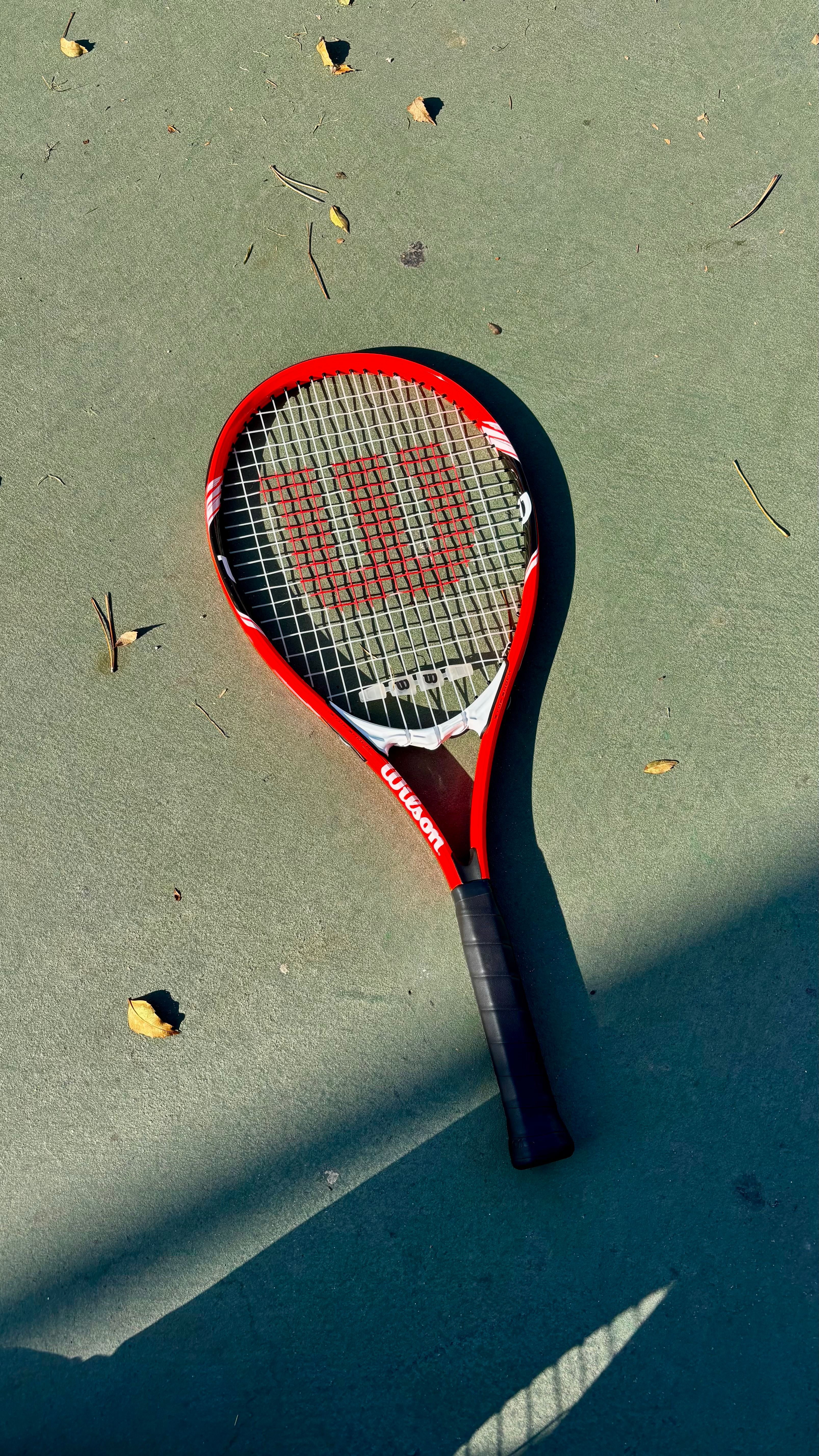 Chair on Tennis Court Next to Racket and Balls · Free Stock Photo
