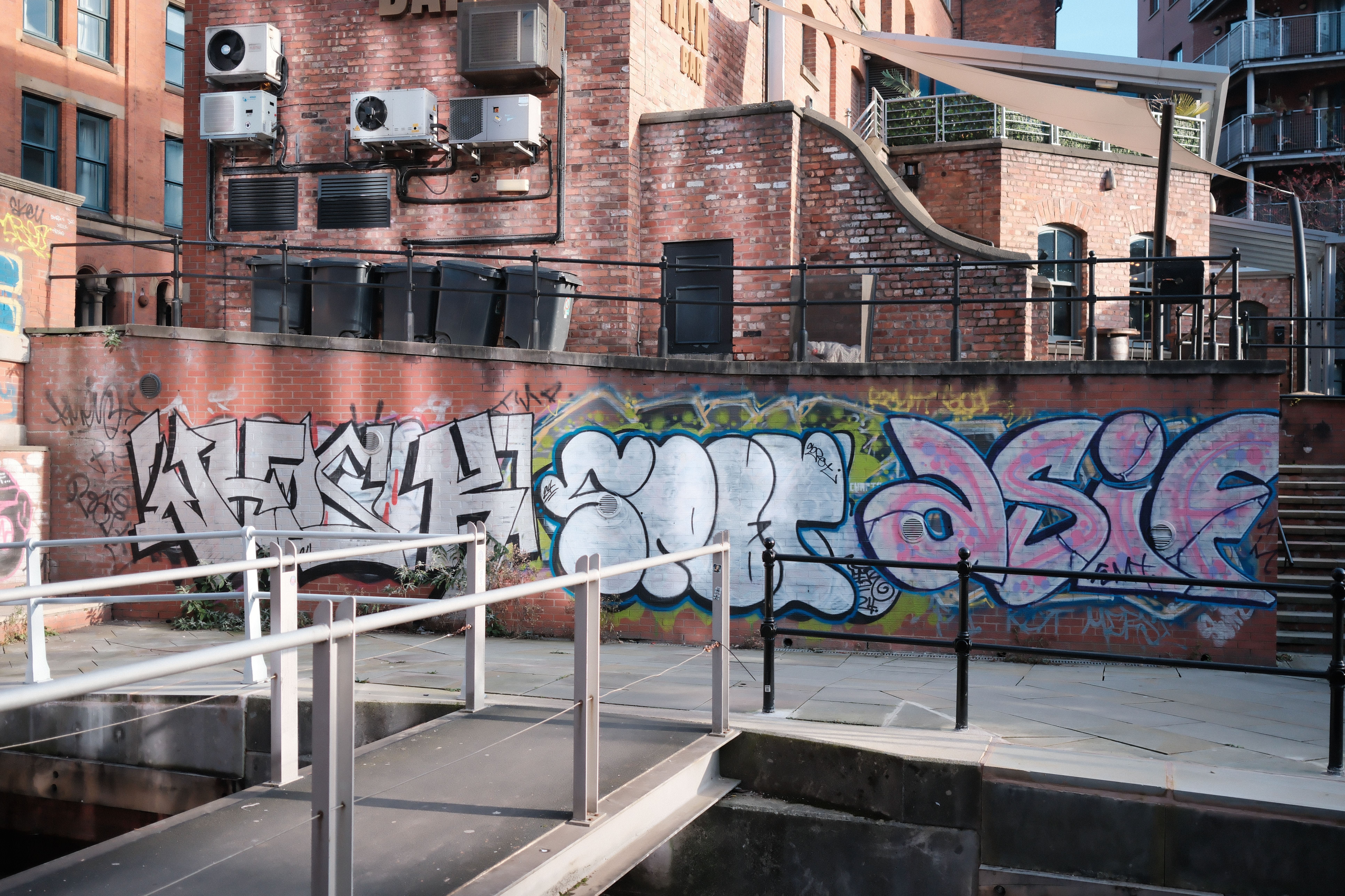 Urban Street Art on Brick Wall Outdoors · Free Stock Photo