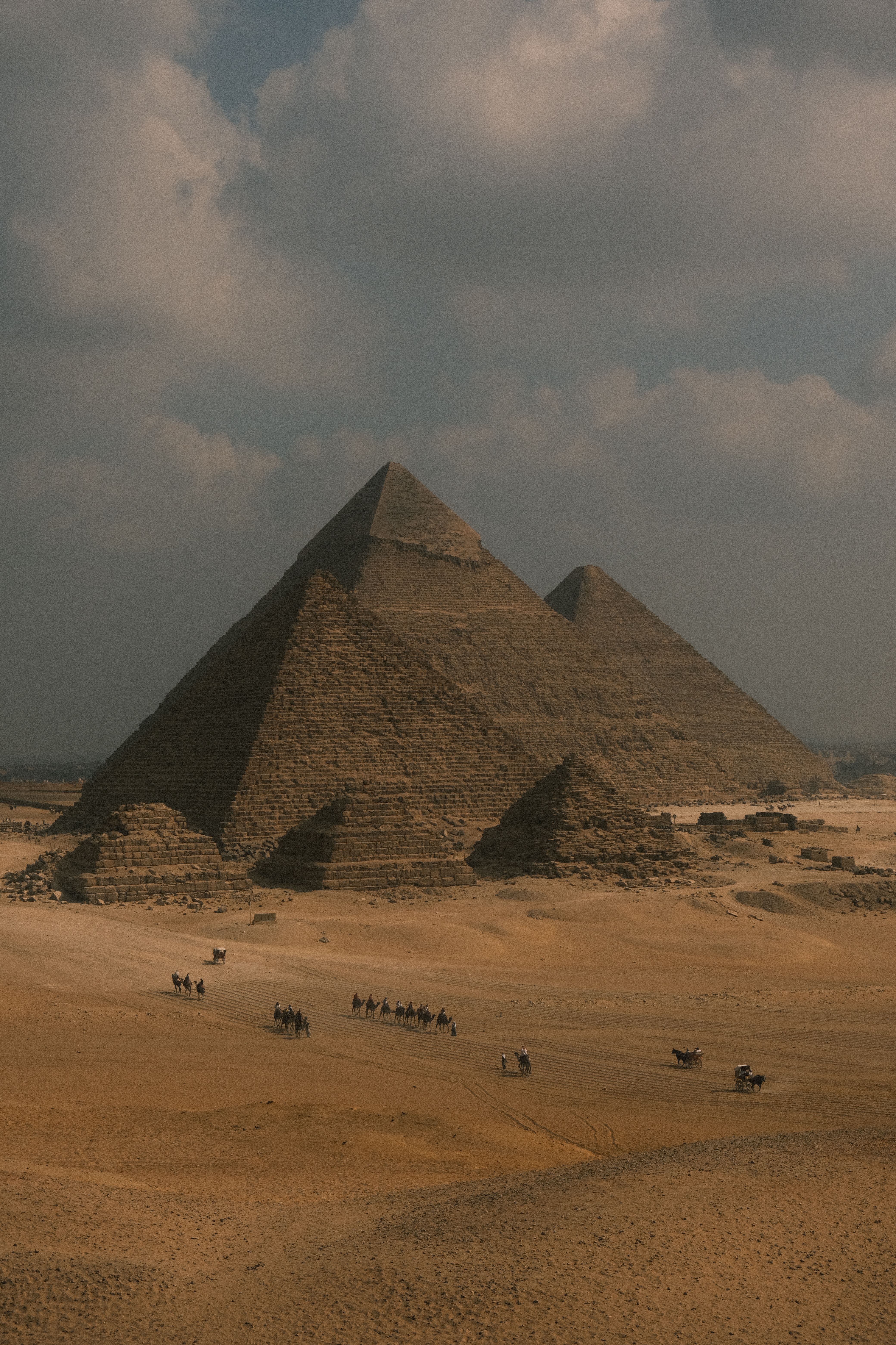 Majestic Pyramids of Giza under Cloudy Sky · Free Stock Photo