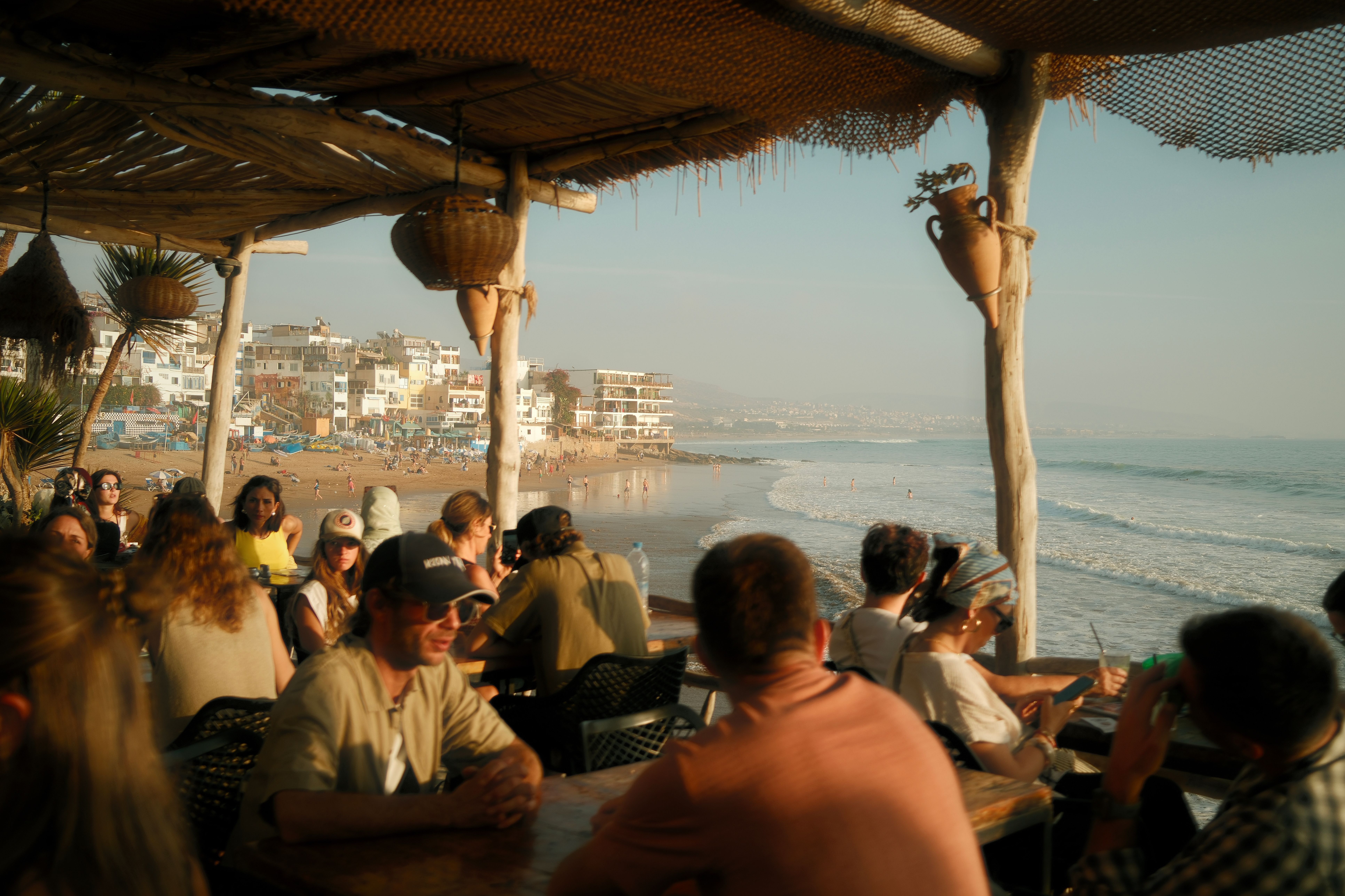 Relaxing Beachfront Cafe in Morocco at Sunset · Free Stock Photo