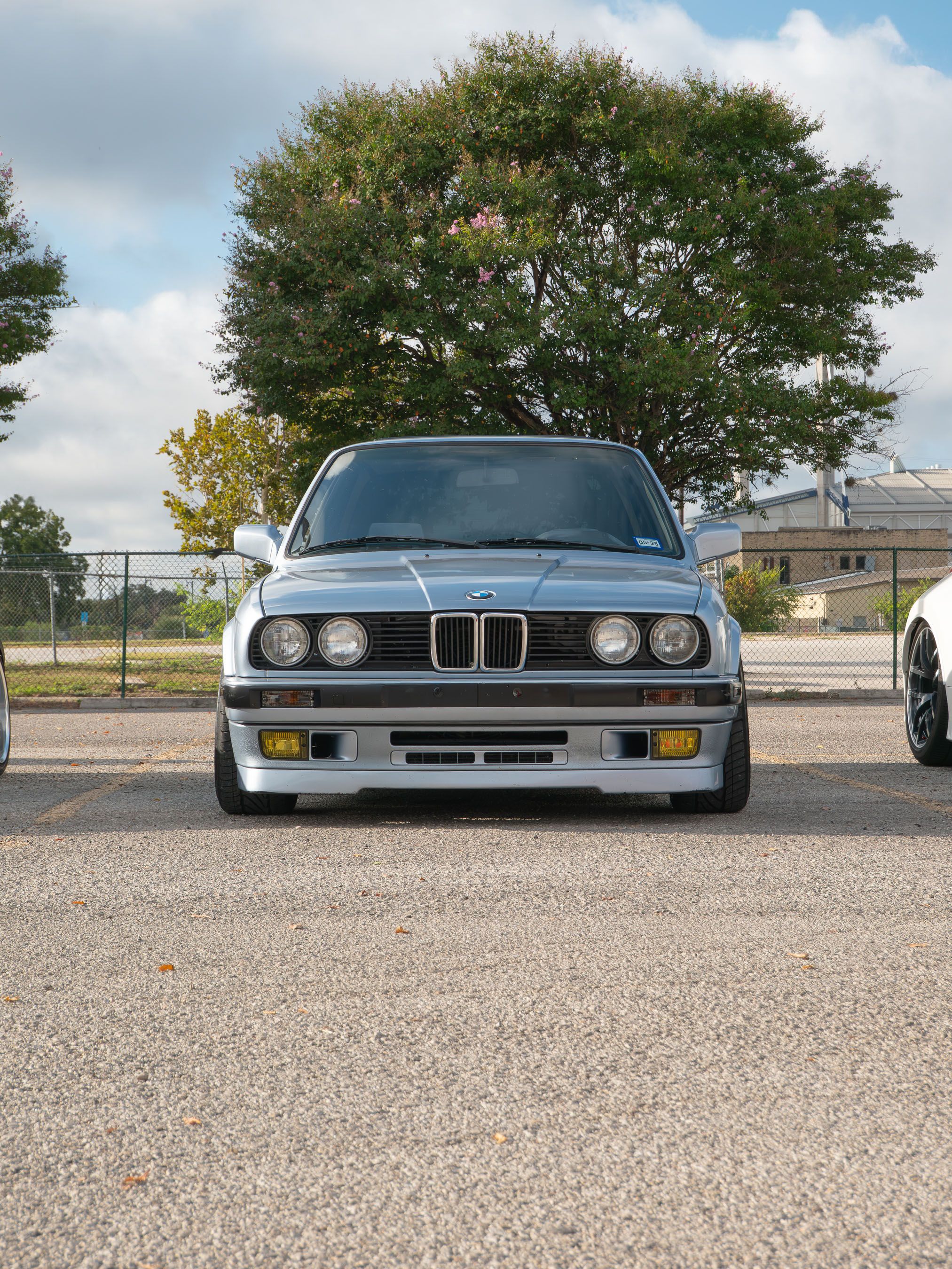 Classic Silver BMW E30 in Outdoor Parking Lot · Free Stock Photo