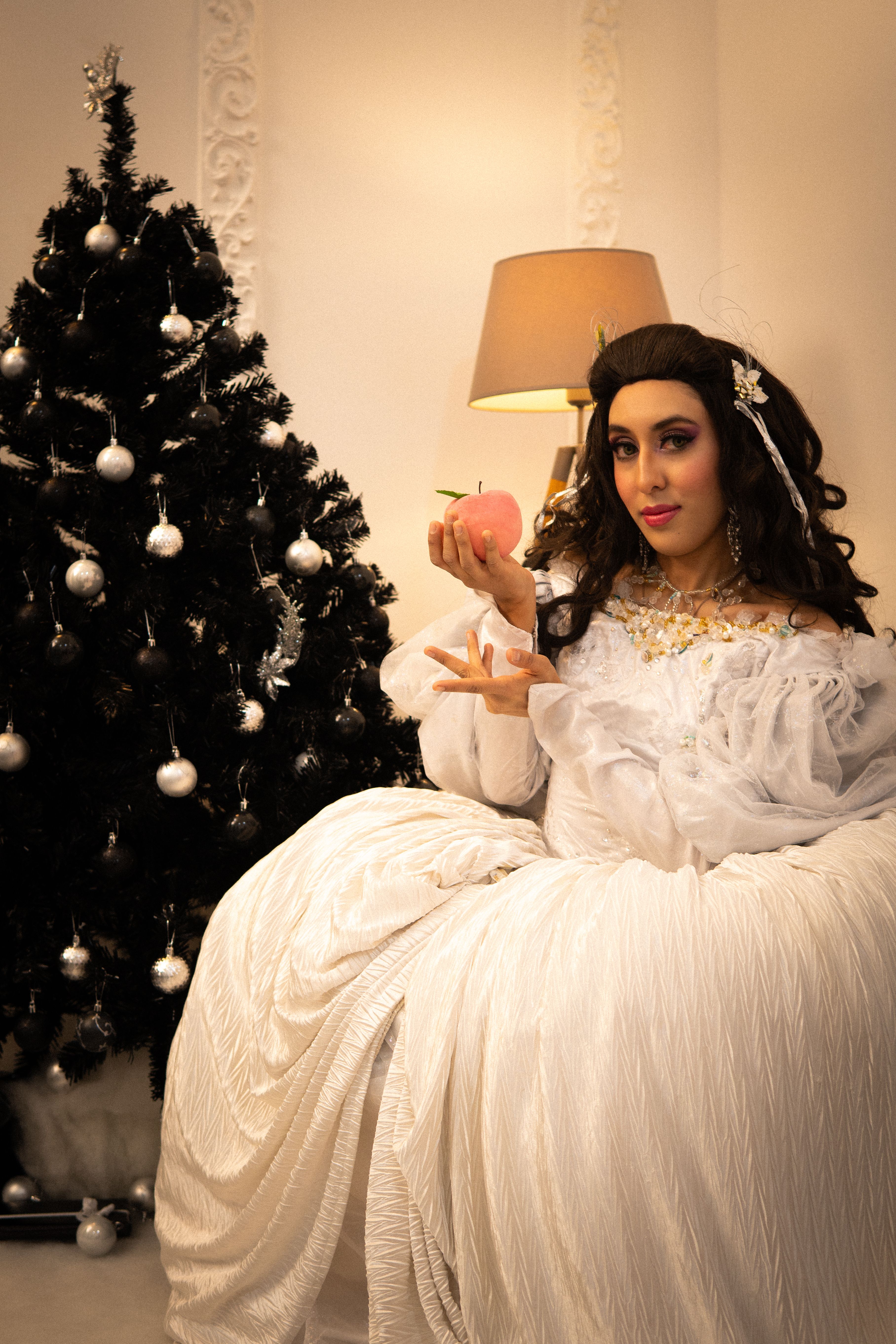 Elegant Cosplay at Christmas with Black Tree · Free Stock Photo
