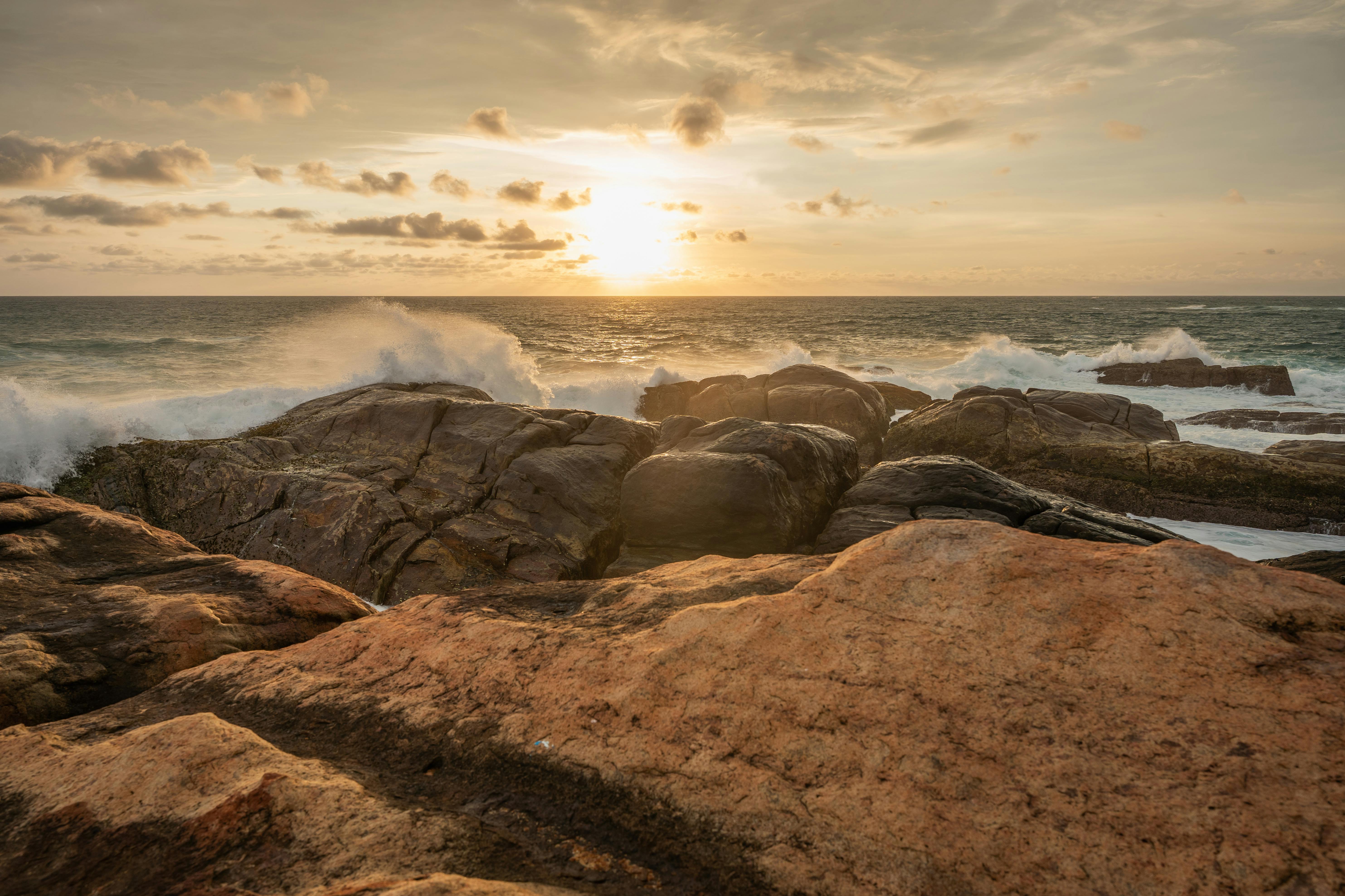 Sunset Over Rocky Shoreline in Sri Lanka · Free Stock Photo