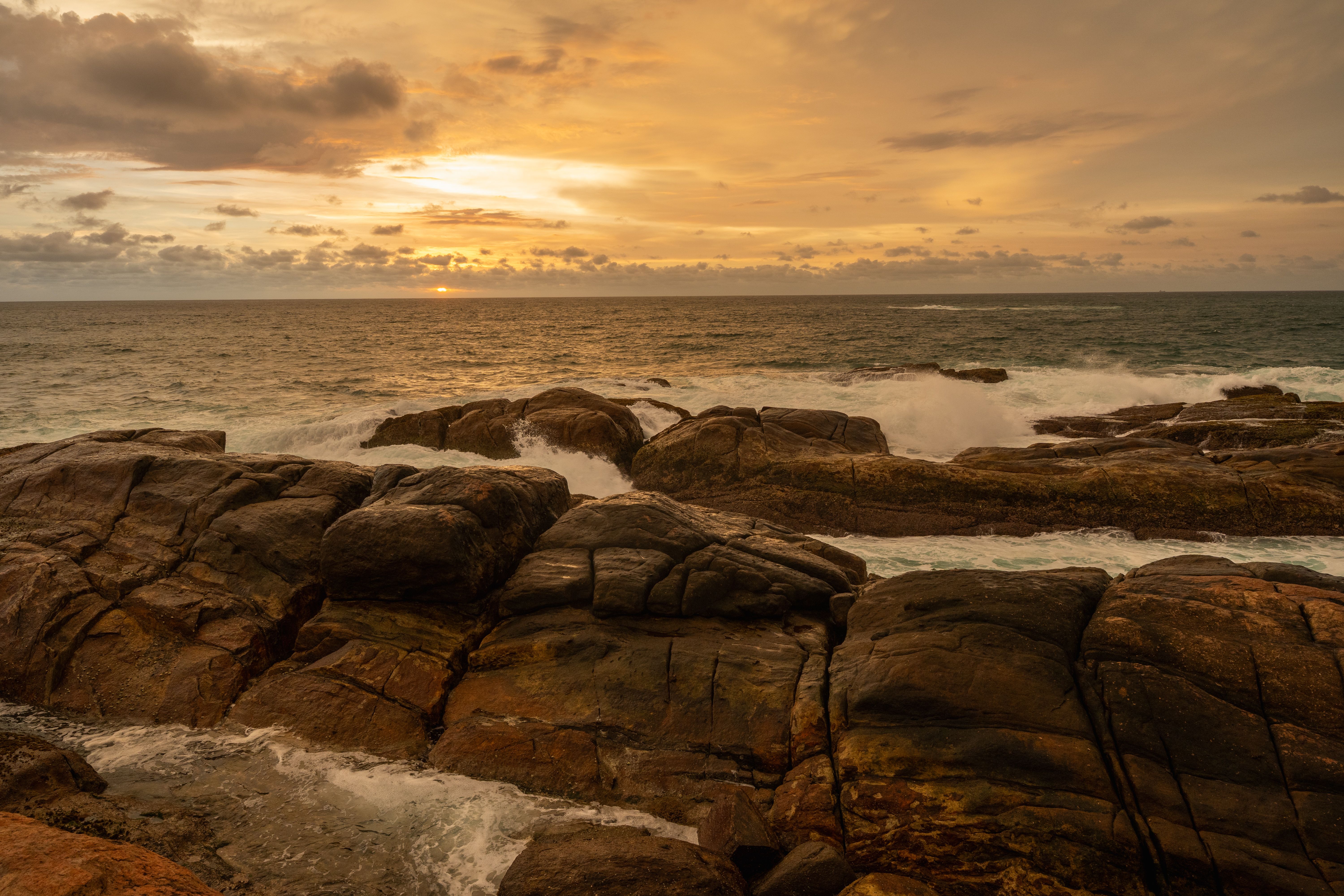Majestic Sunset Over Rocky Sri Lankan Coastline · Free Stock Photo
