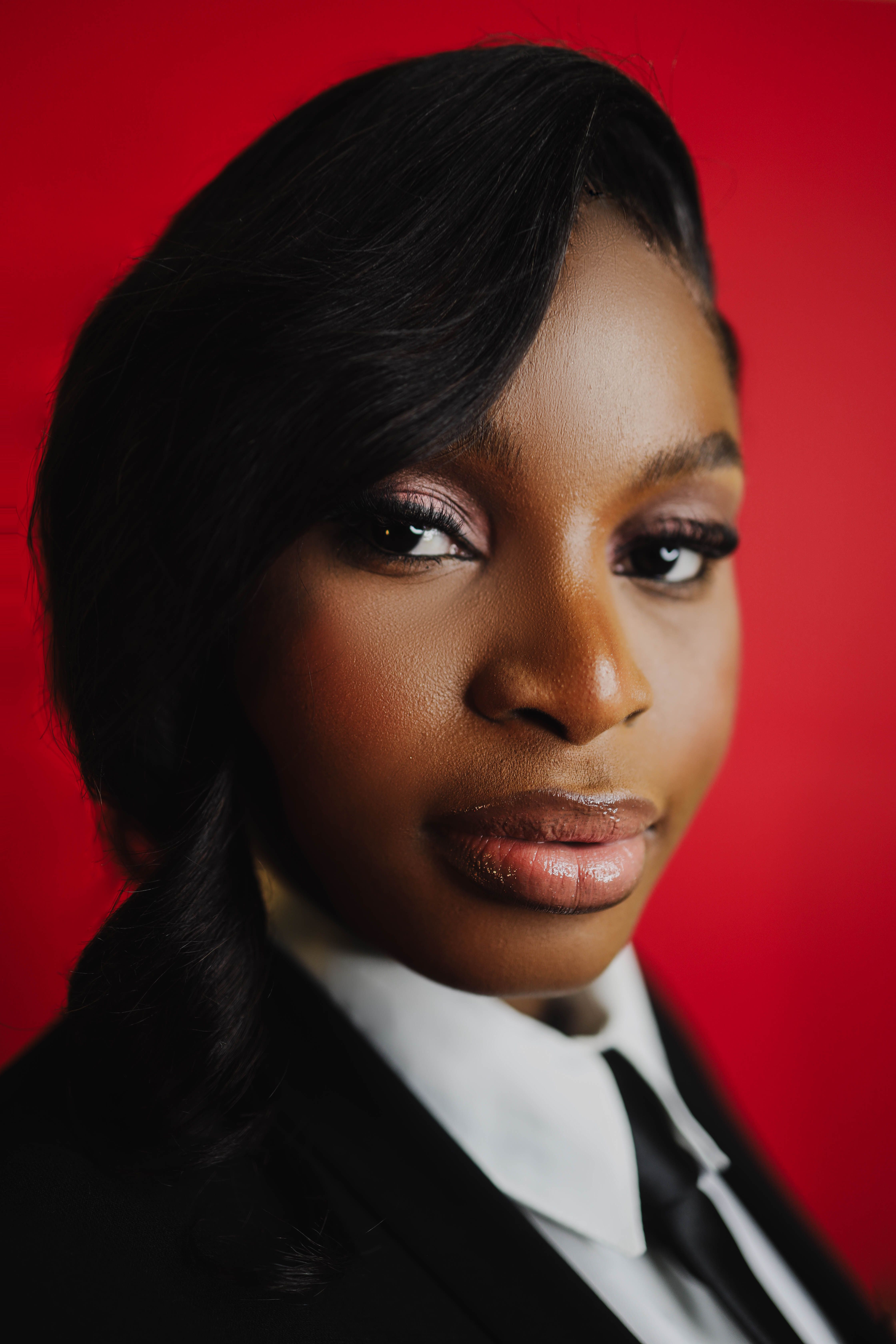 Elegant Portrait of a Woman in Formal Suit · Free Stock Photo
