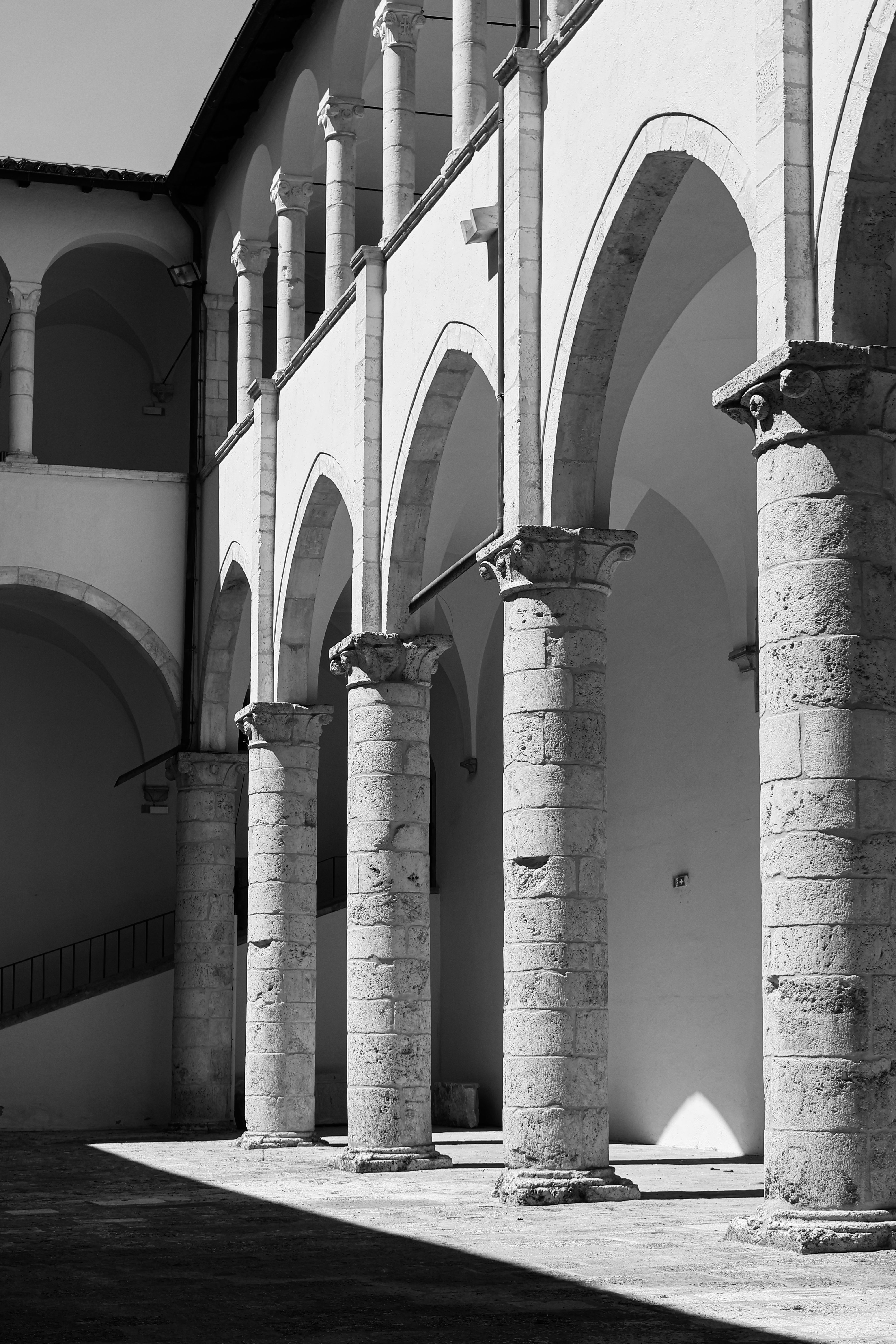 Elegant Black and White Arched Columns in Rome · Free Stock Photo