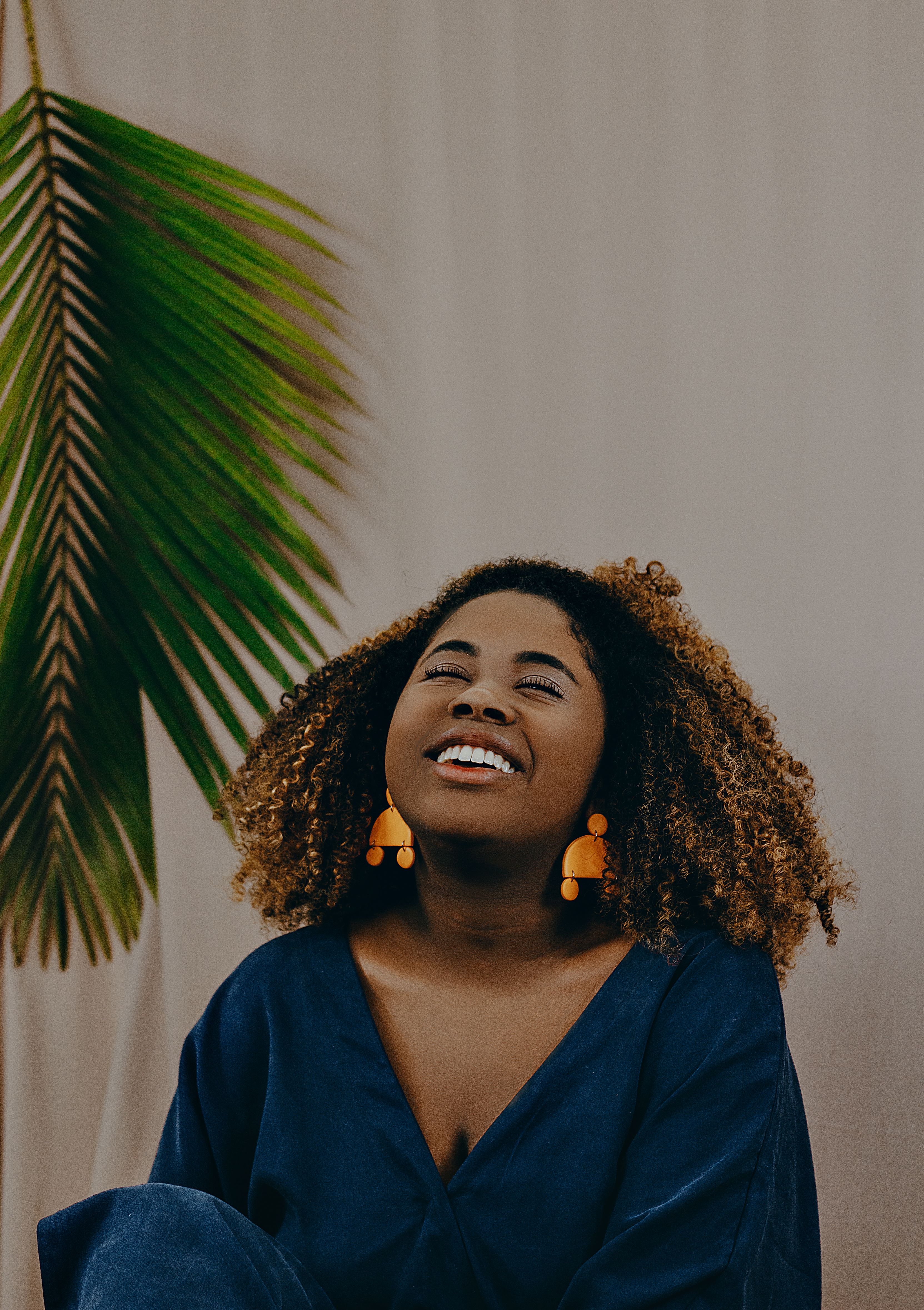 Woman Wearing Blue V Neck Top · Free Stock Photo