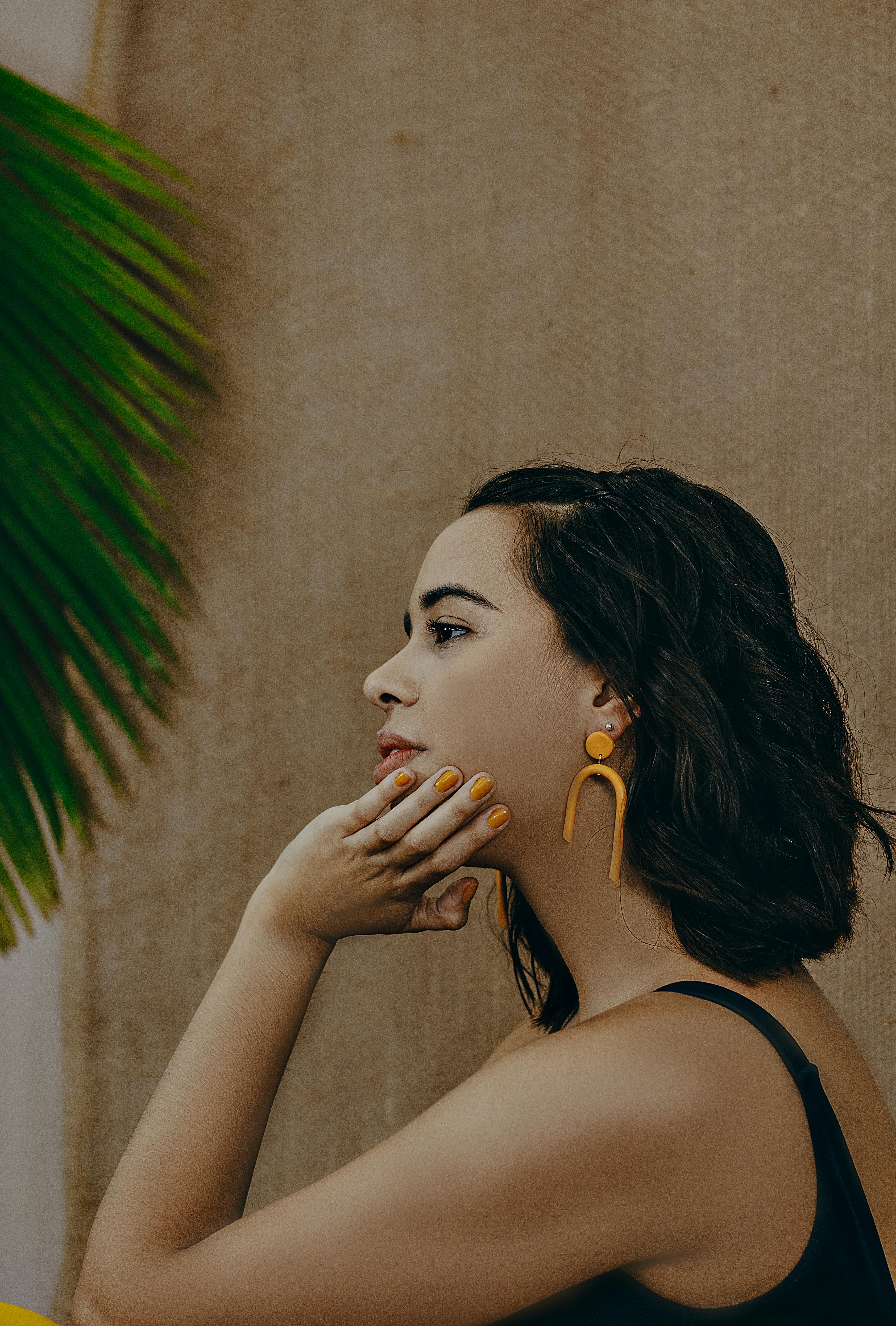 Side View Of A Woman in Black Tank Top · Free Stock Photo