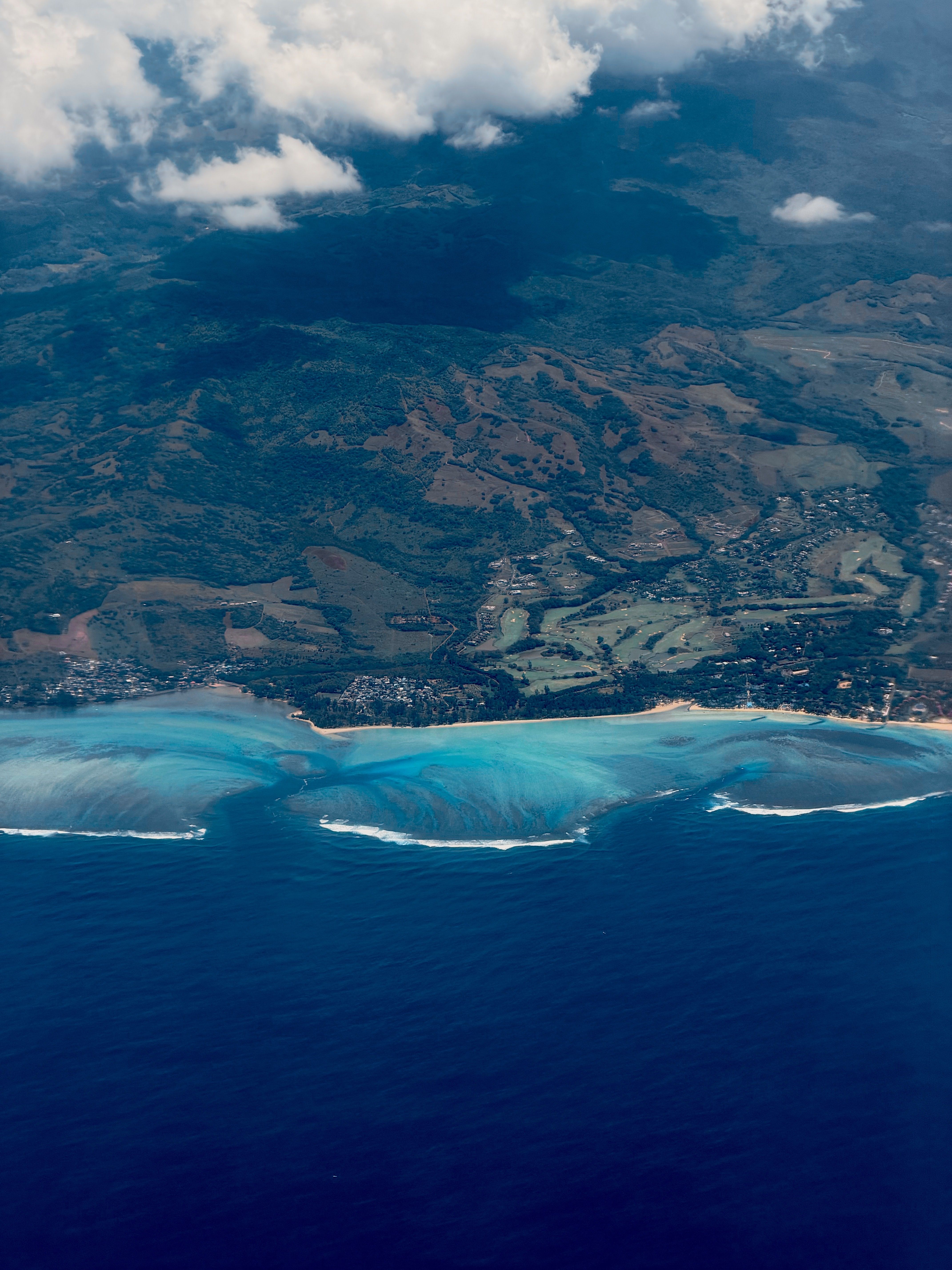 Aerial View of Vibrant Coastal Landscape · Free Stock Photo