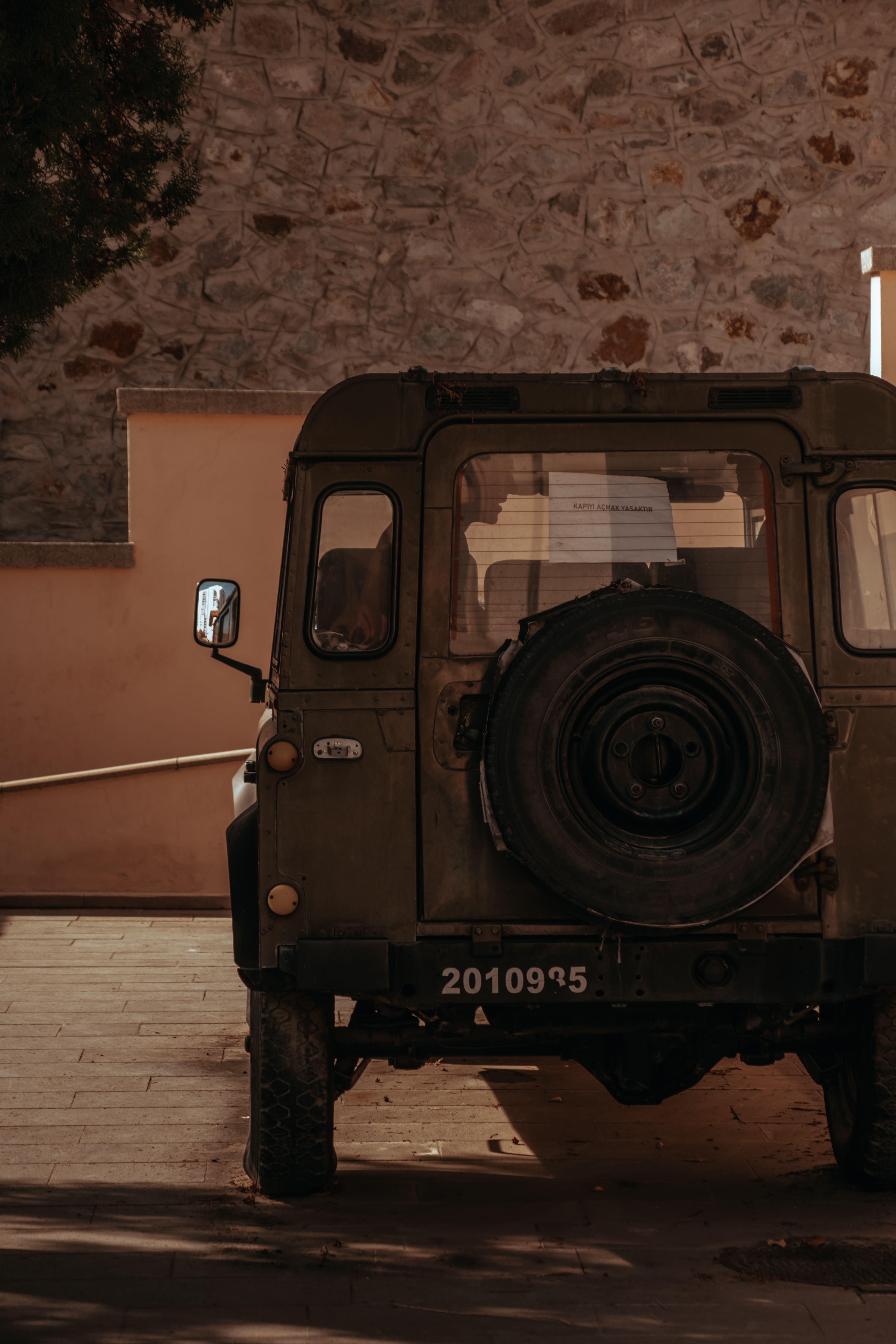 Vintage Off-Road Vehicle in Rustic Setting · Free Stock Photo
