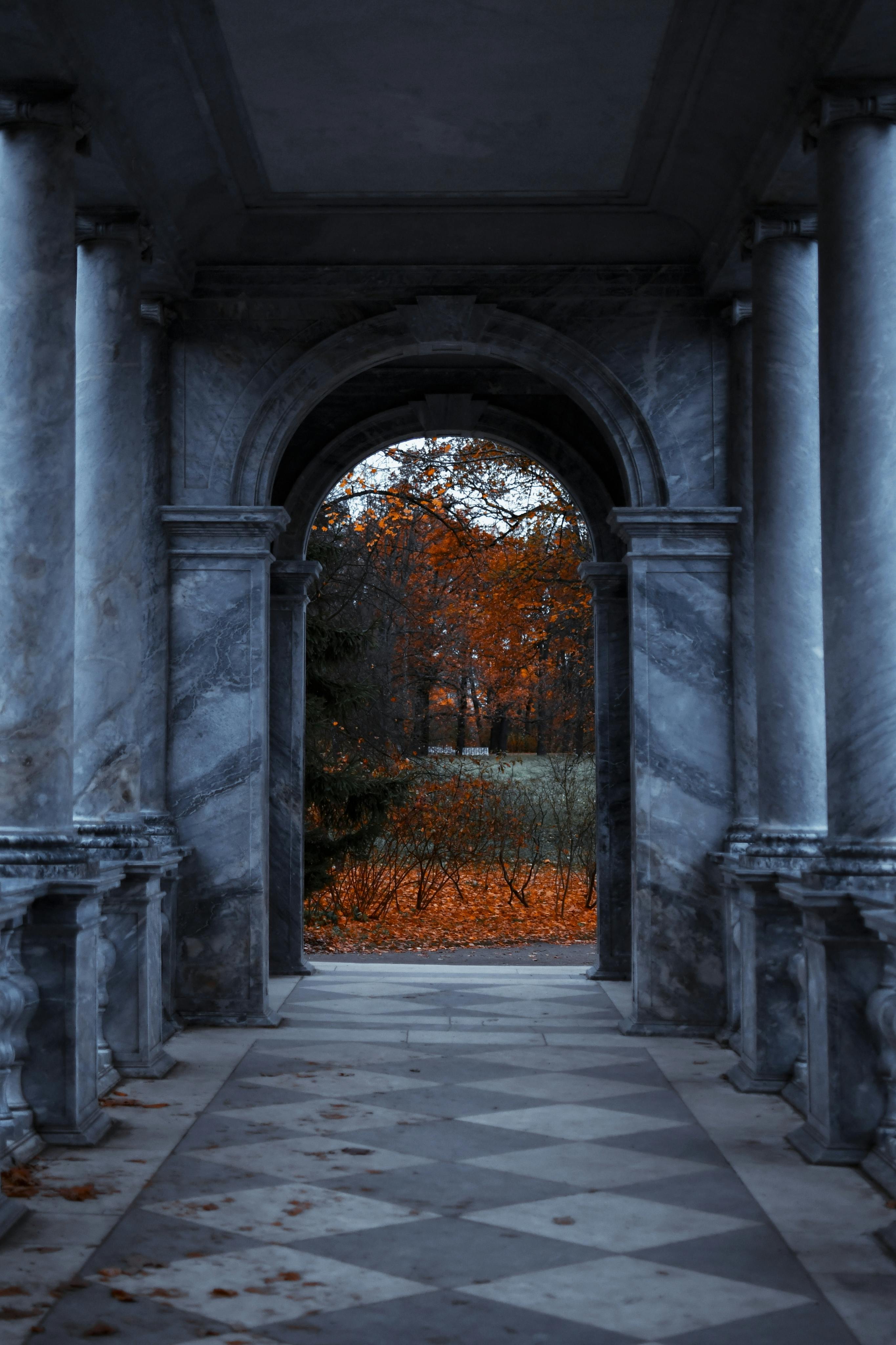Elegant Archway Overlooking Autumn Landscape · Free Stock Photo