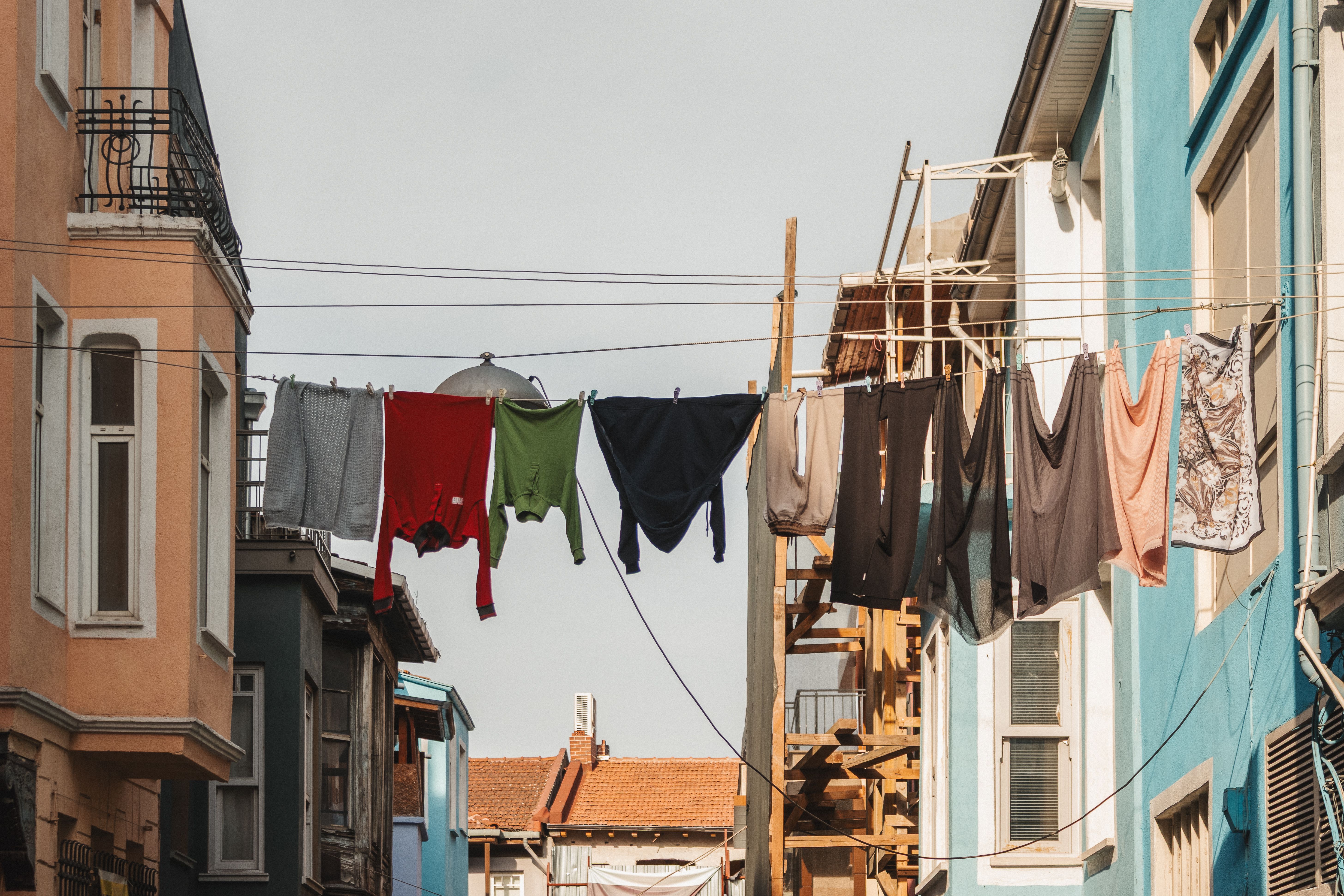 Urban Laundry Hanging in Rustic Courtyard · Free Stock Photo
