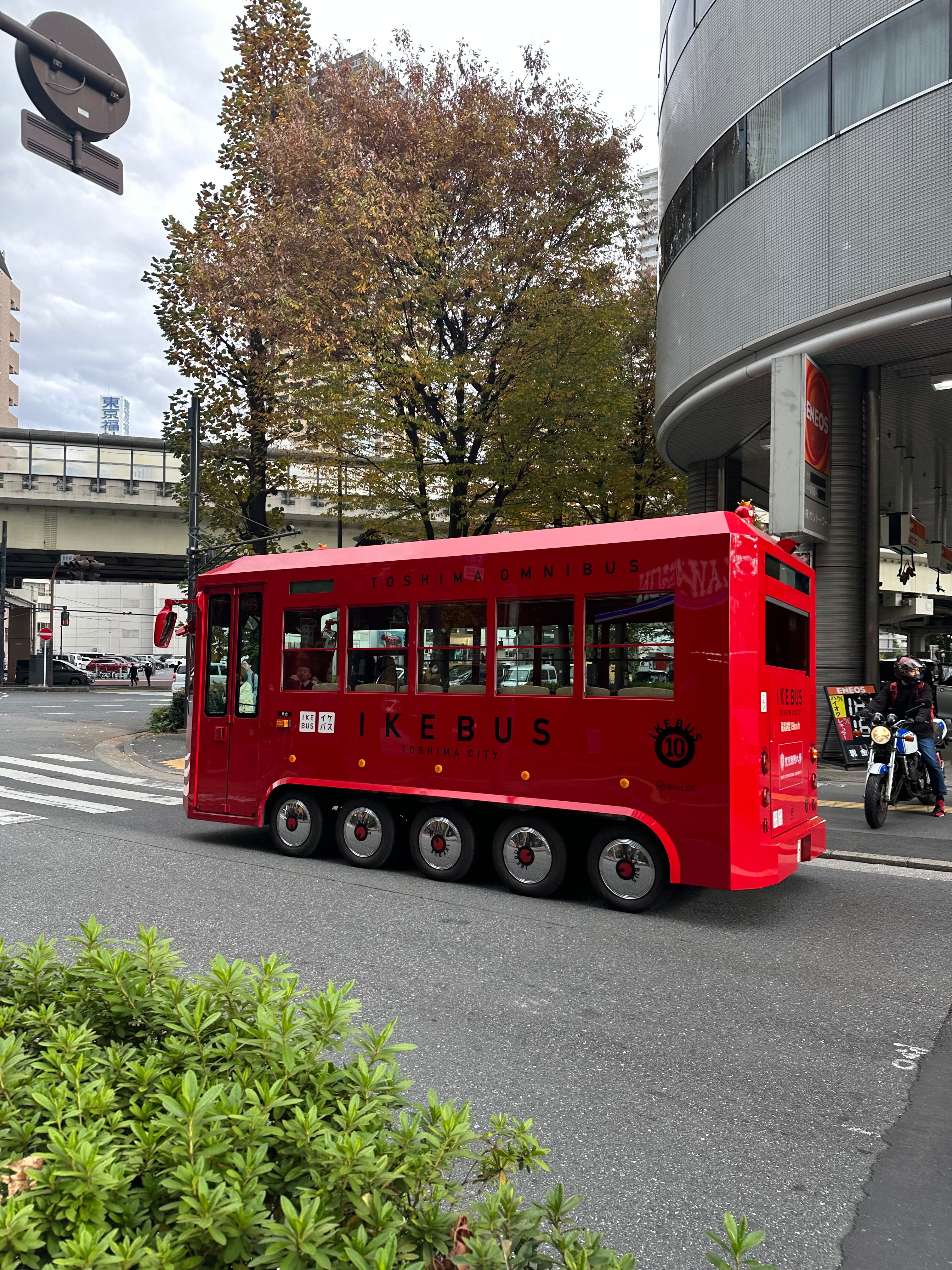 Red IKEBUS in Tokyo's Ikebukuro District · Free Stock Photo